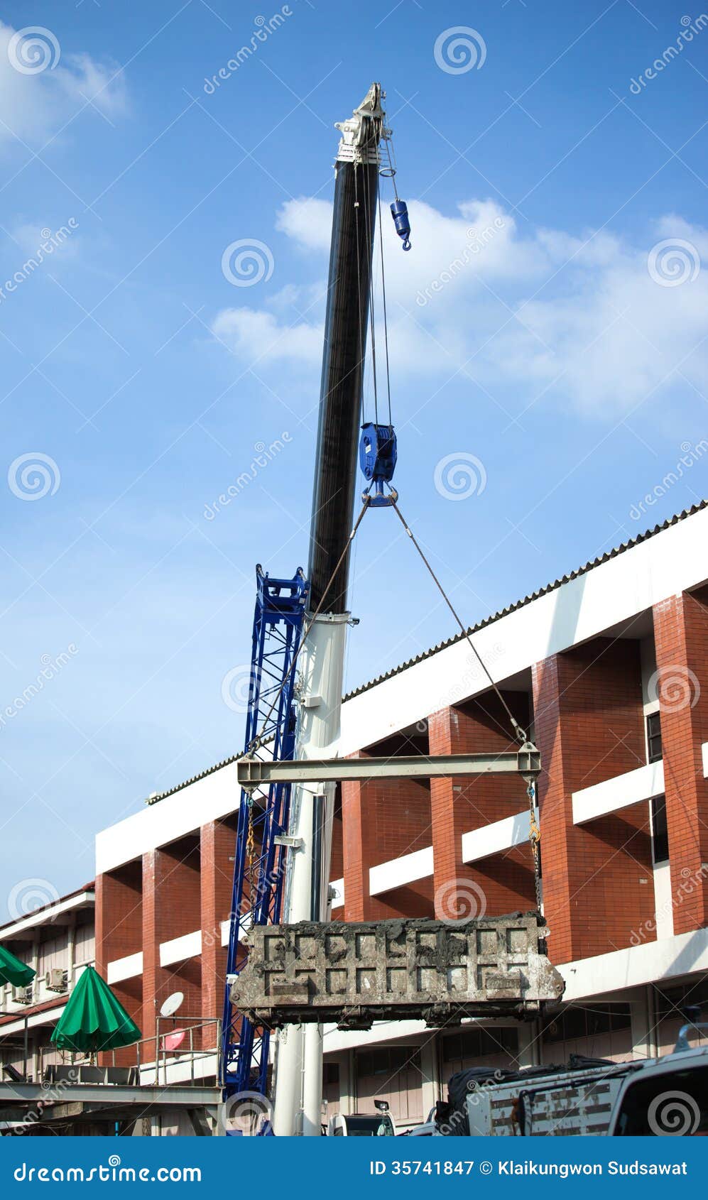 Crane lifting soil stock image. Image of growth, equipment - 35741847
