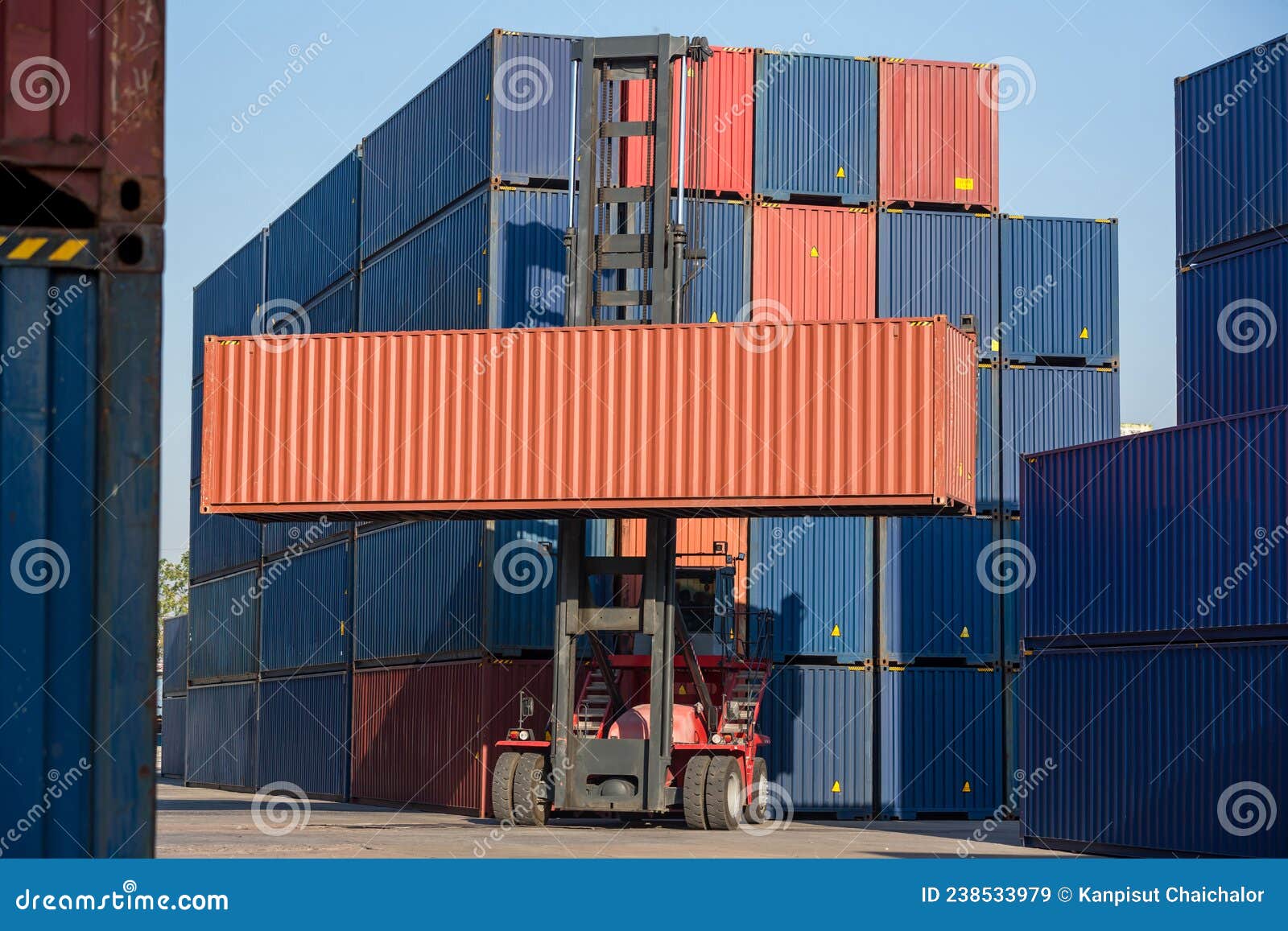 Crane Lifting Up Container in Railroad Yard. Crane Lifting Up Container ...