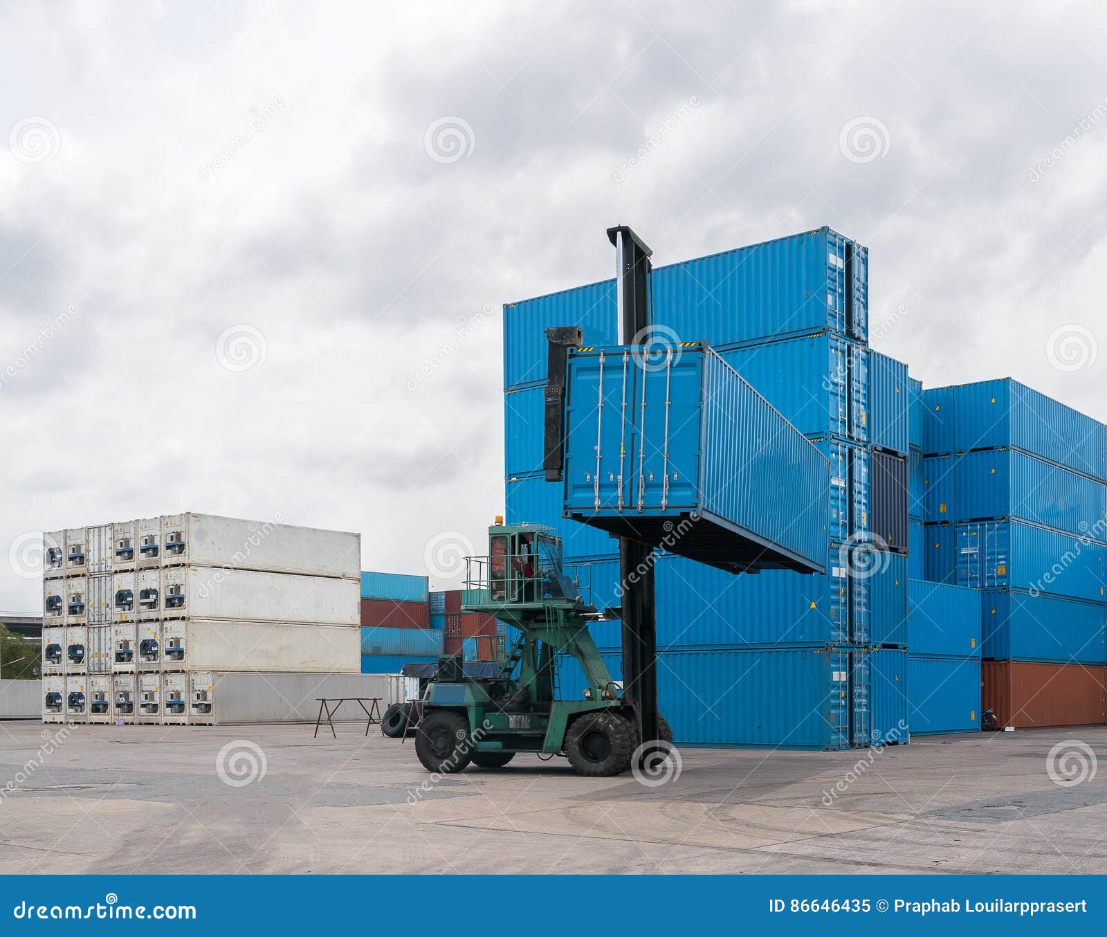 Crane Lifting Up Container in Yard Stock Image - Image of crane, blue ...