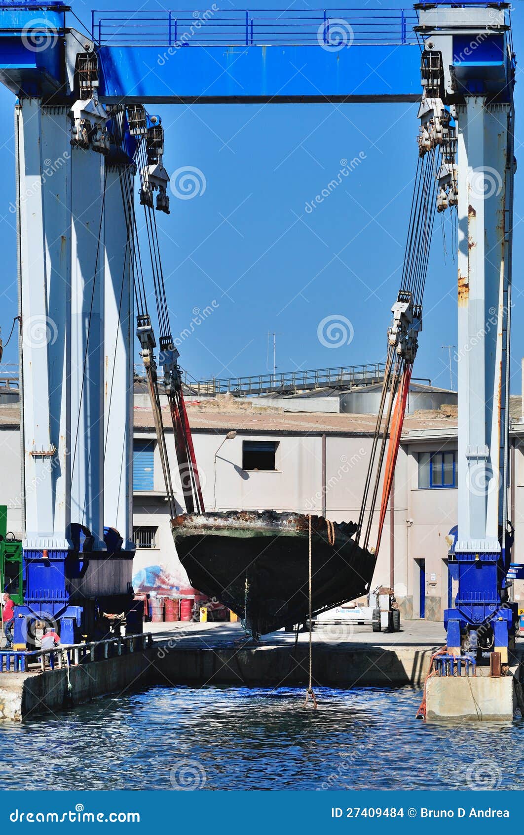 Crane lifts a boat stock photo. Image of shipping, pier - 27409484