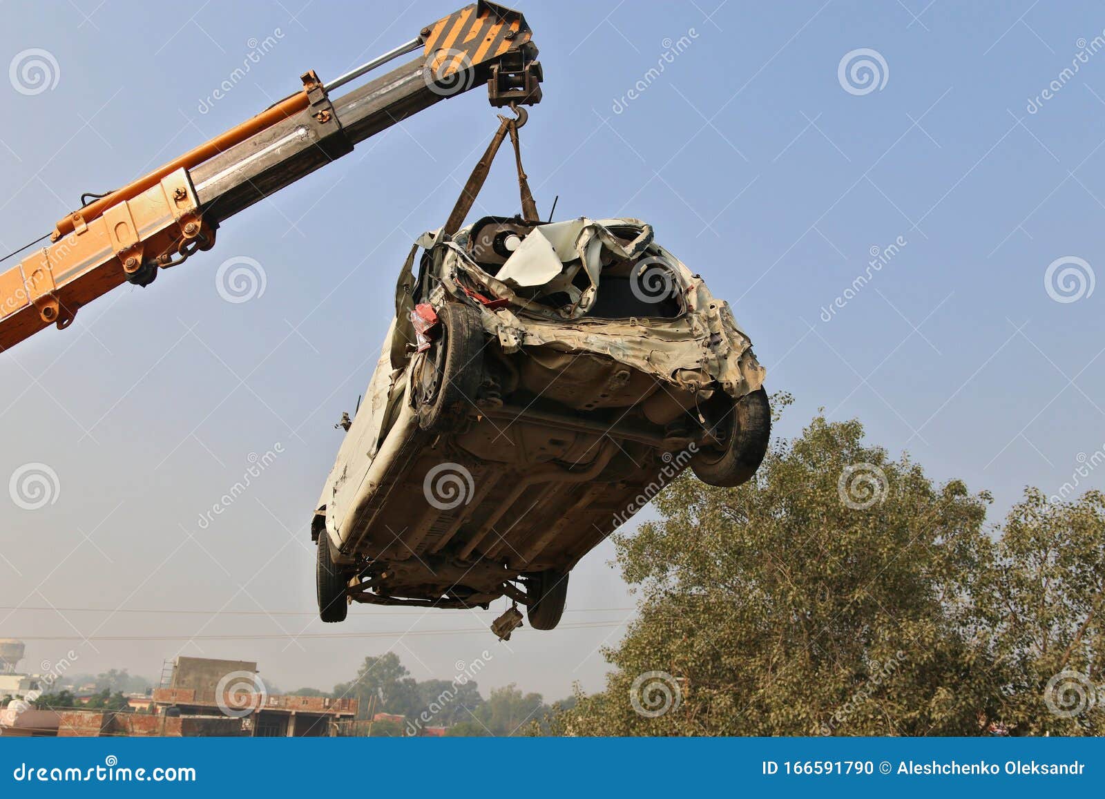 Crane Lifts a Broken Machine for Loading at the Scene of an Accident ...
