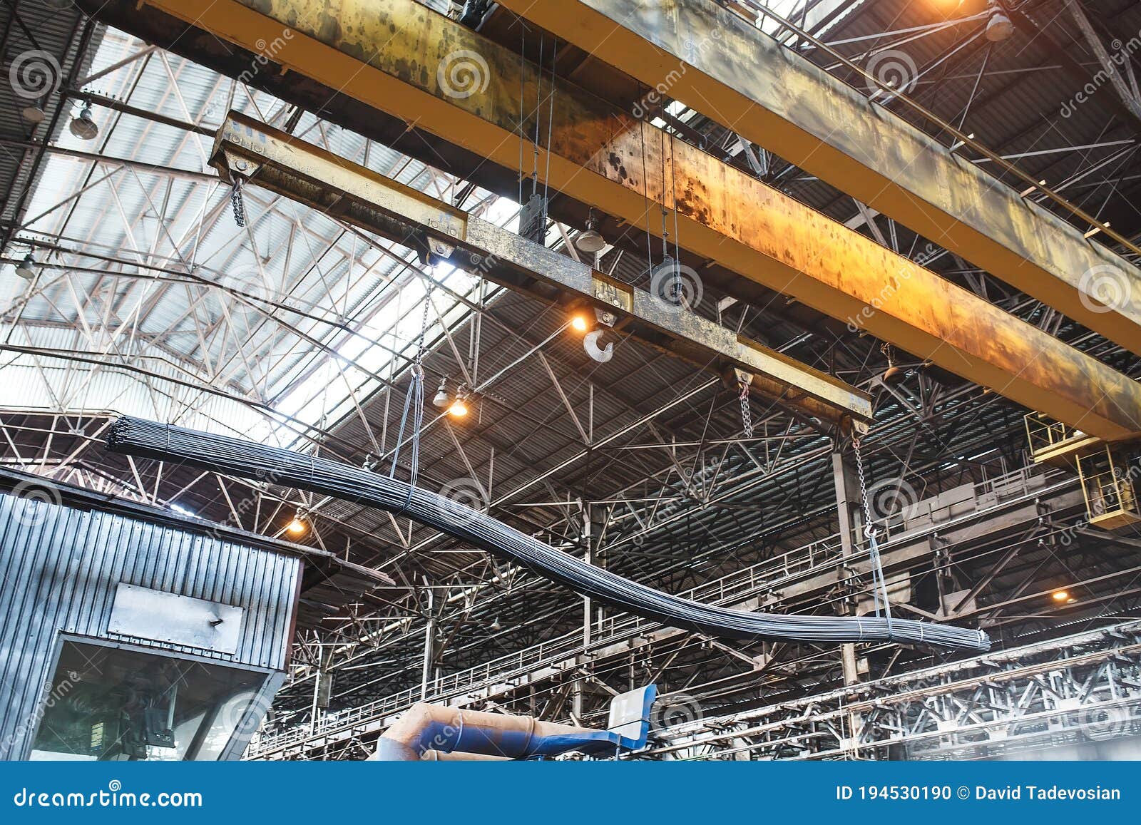 Crane Loader Carries Rebar and Wire Rod in the Factory Stock Photo ...