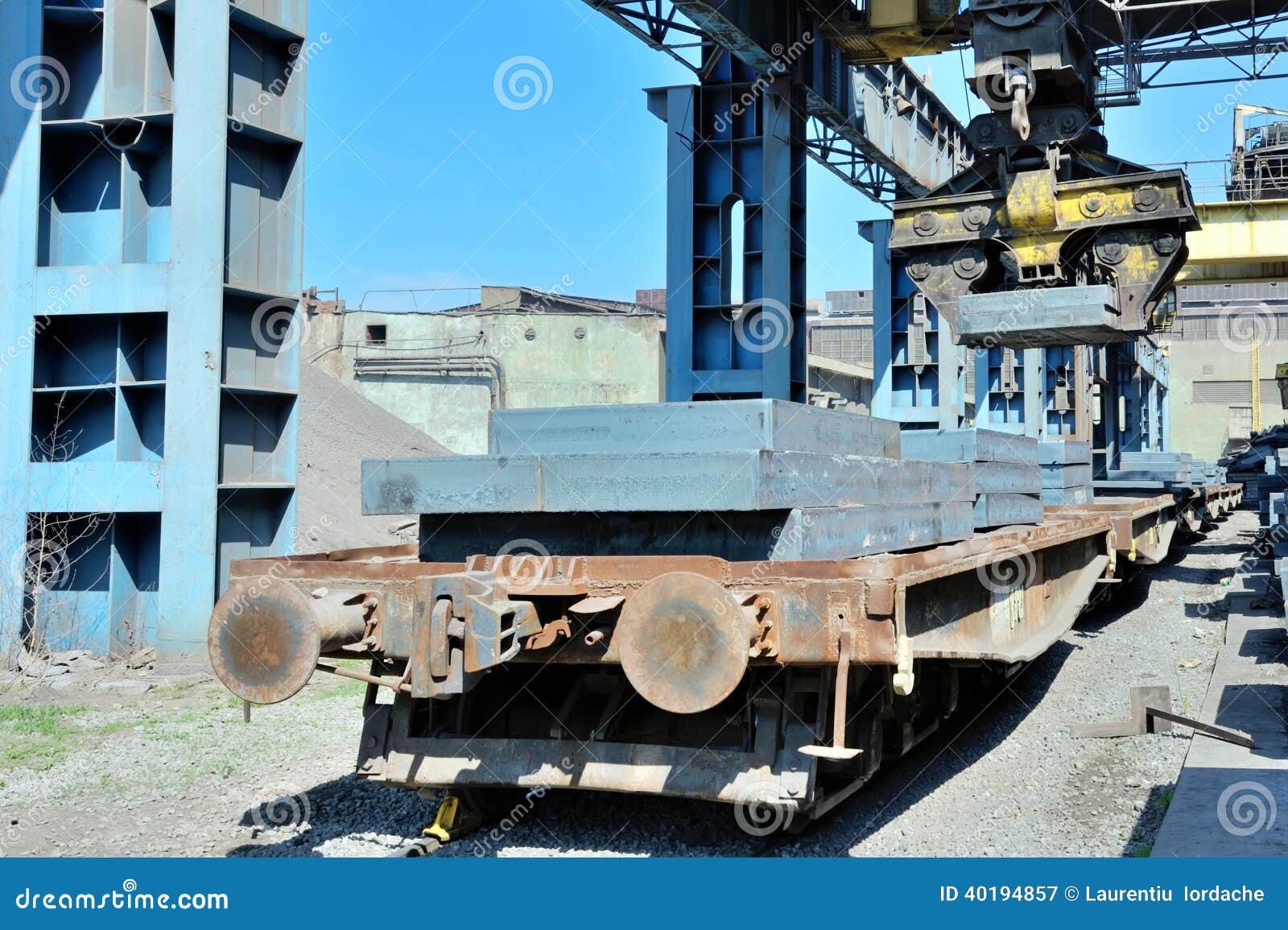 Crane loading steel stack stock image. Image of inspector - 40194857