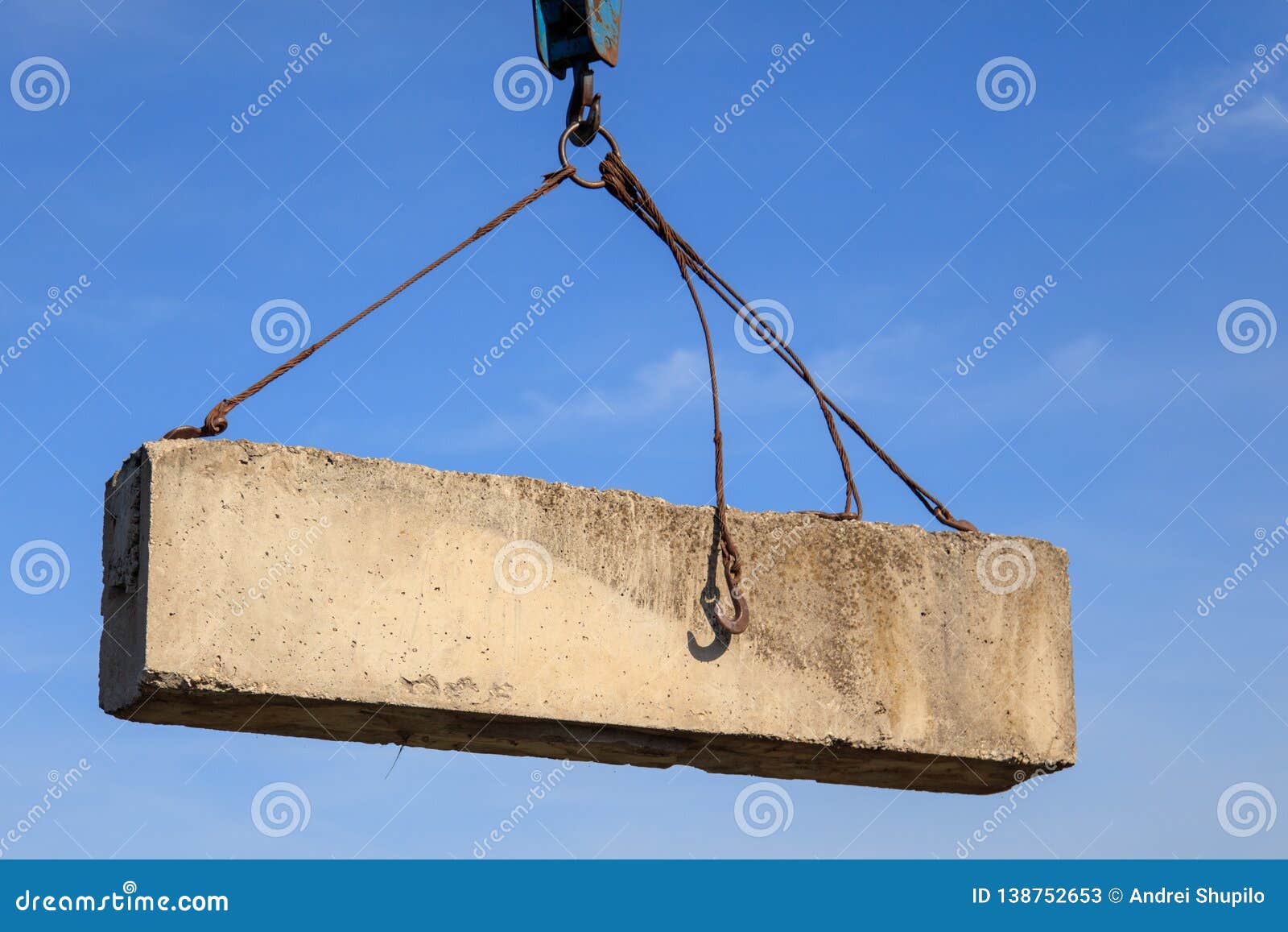 The Crane Loads Old Concrete Blocks at the Construction Site Stock ...