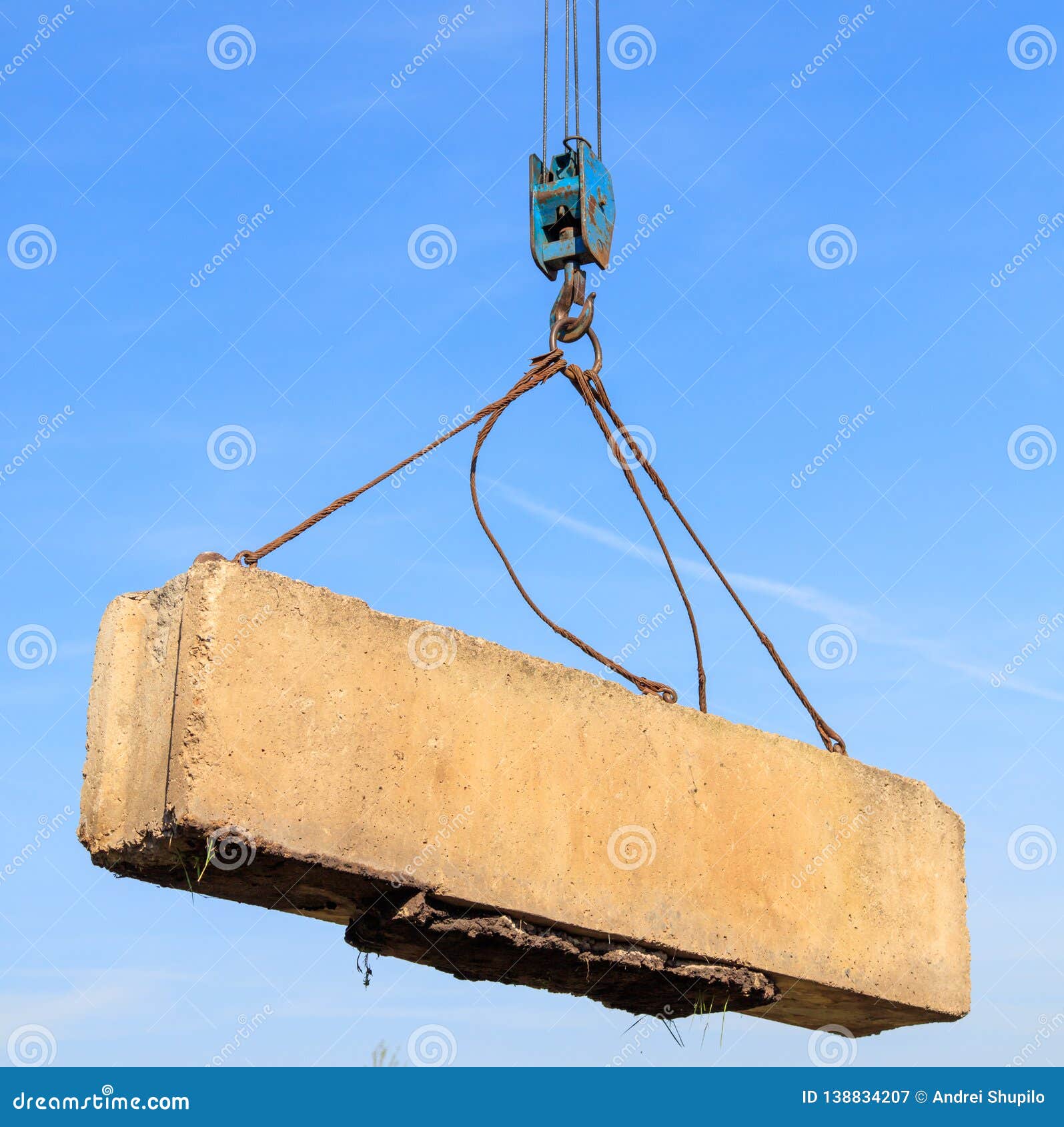 The Crane Loads Old Concrete Blocks at the Construction Site Stock ...