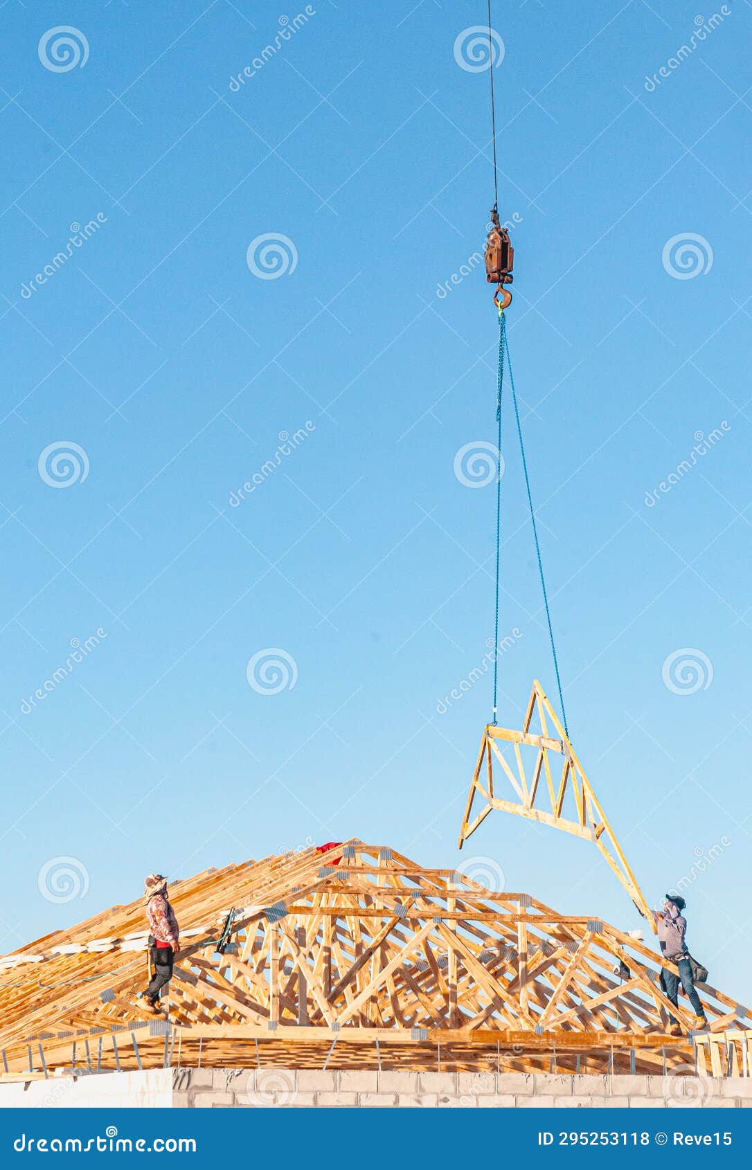 Crane Moving Roof Trusses, into Place Stock Photo - Image of view, roof ...