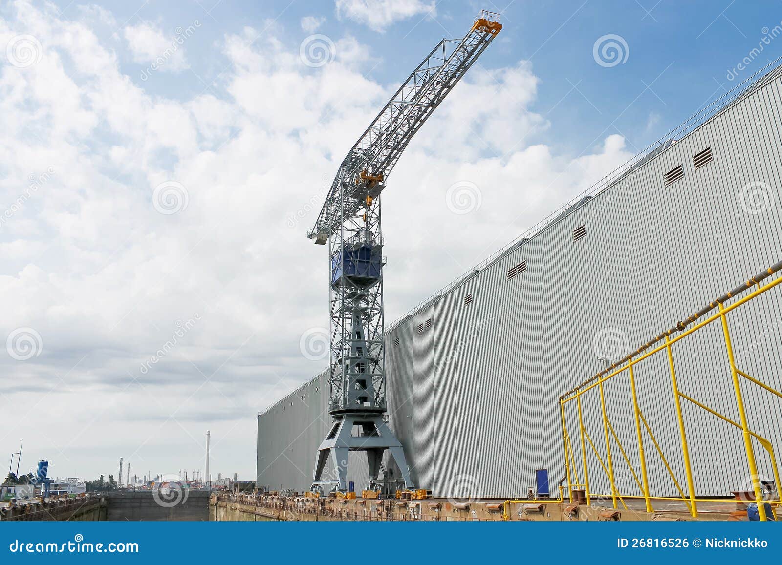 Crane Near a Covered Dry Dock Stock Photo - Image of pier, derrick ...