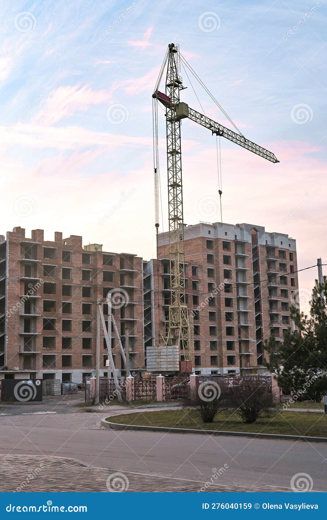 A Crane Operating on a Construction Site. Vertical Stock Image - Image ...