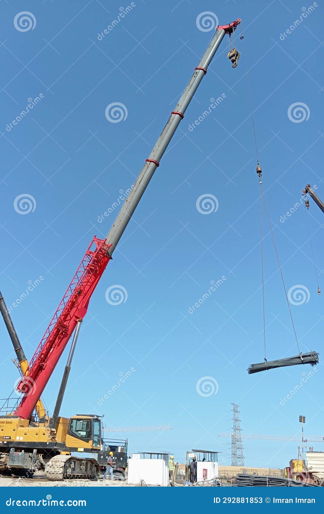 Crane Operator Lifting Iron at a Construction Project Site Editorial ...