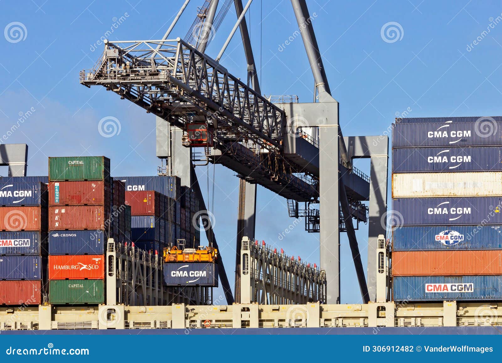 Crane Operator Unloading a Container from a Cargo Ship Editorial ...