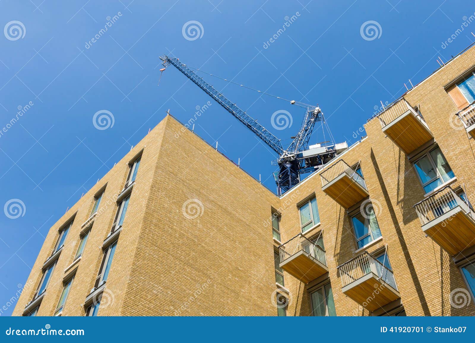 Crane over the building. stock image. Image of dangerous - 41920701