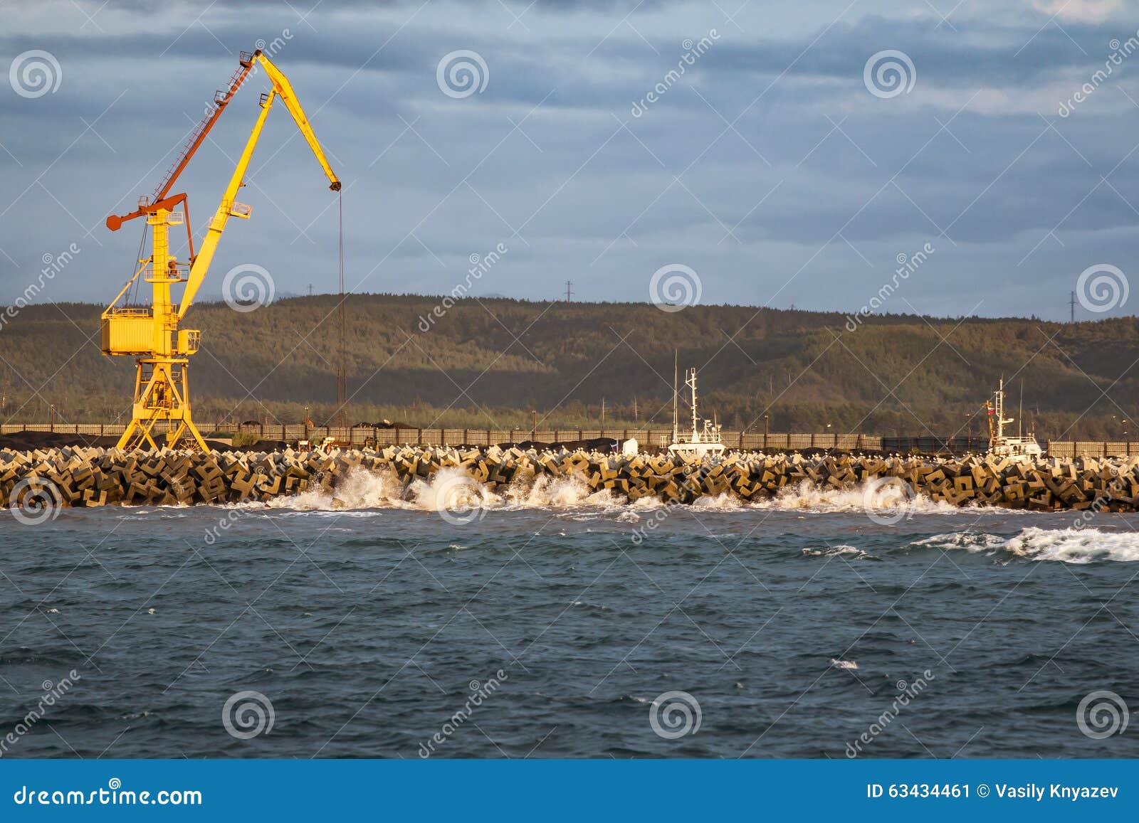 The crane on the pier stock image. Image of cargo, wave - 63434461
