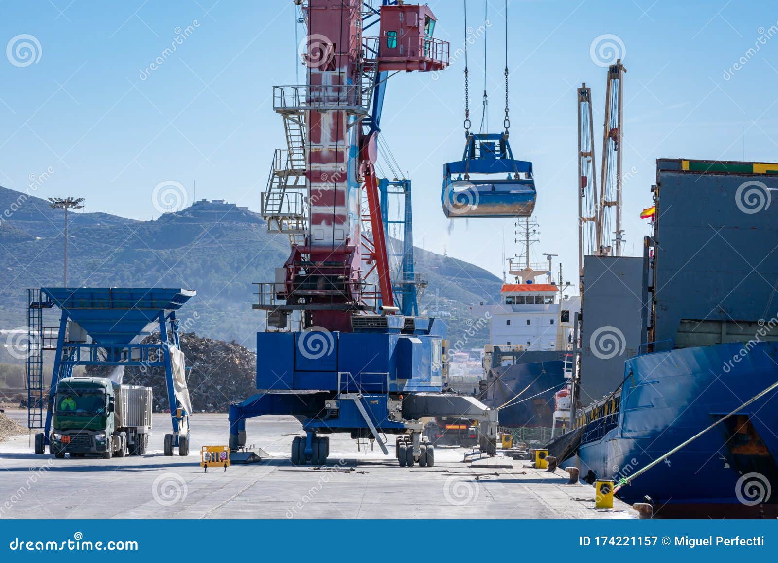 Crane in the Port Unloading a Ship Editorial Photography - Image of ...