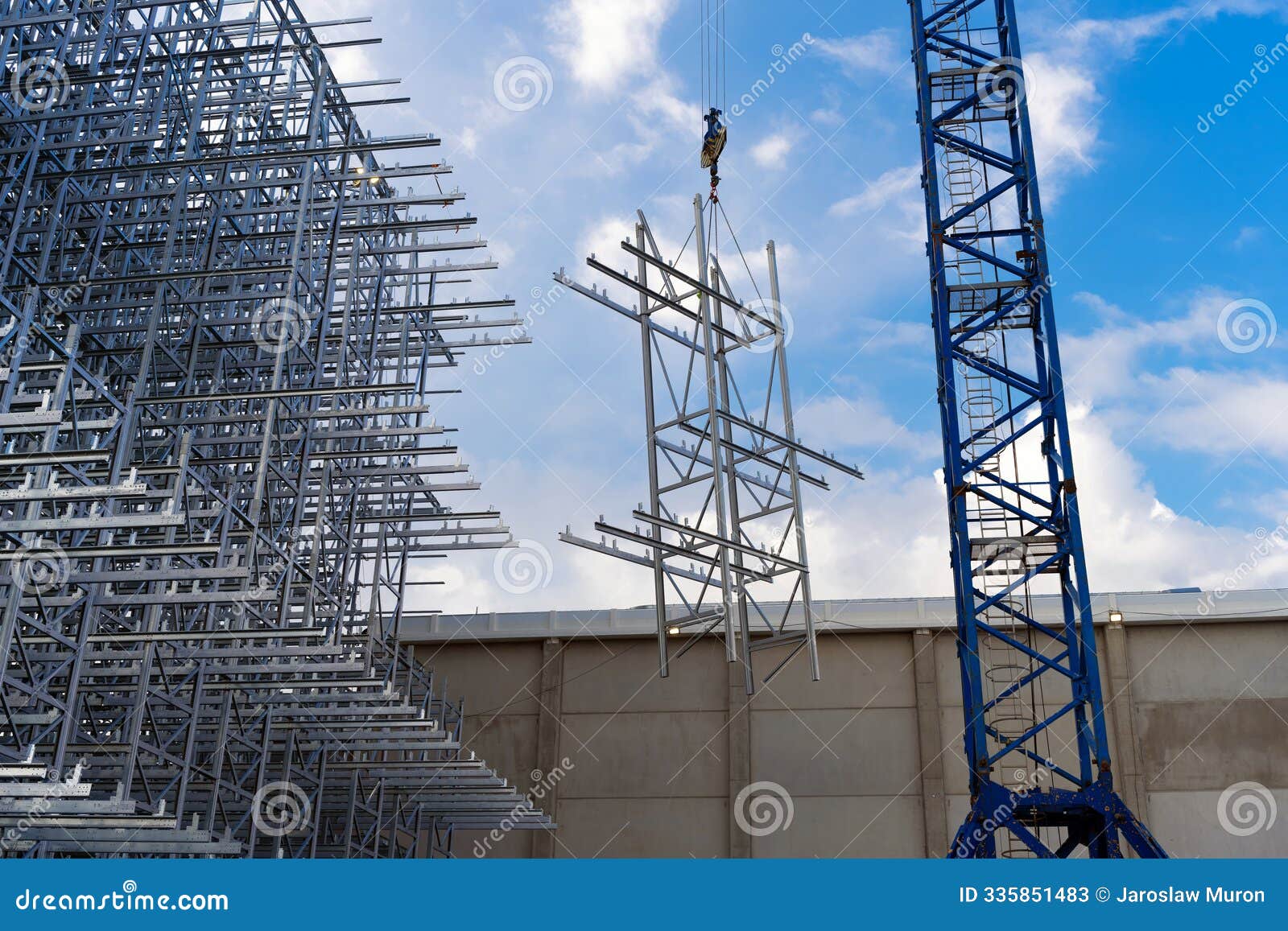 Crane In Process Of ASRS Clad Rack Structural Framework Installation ...