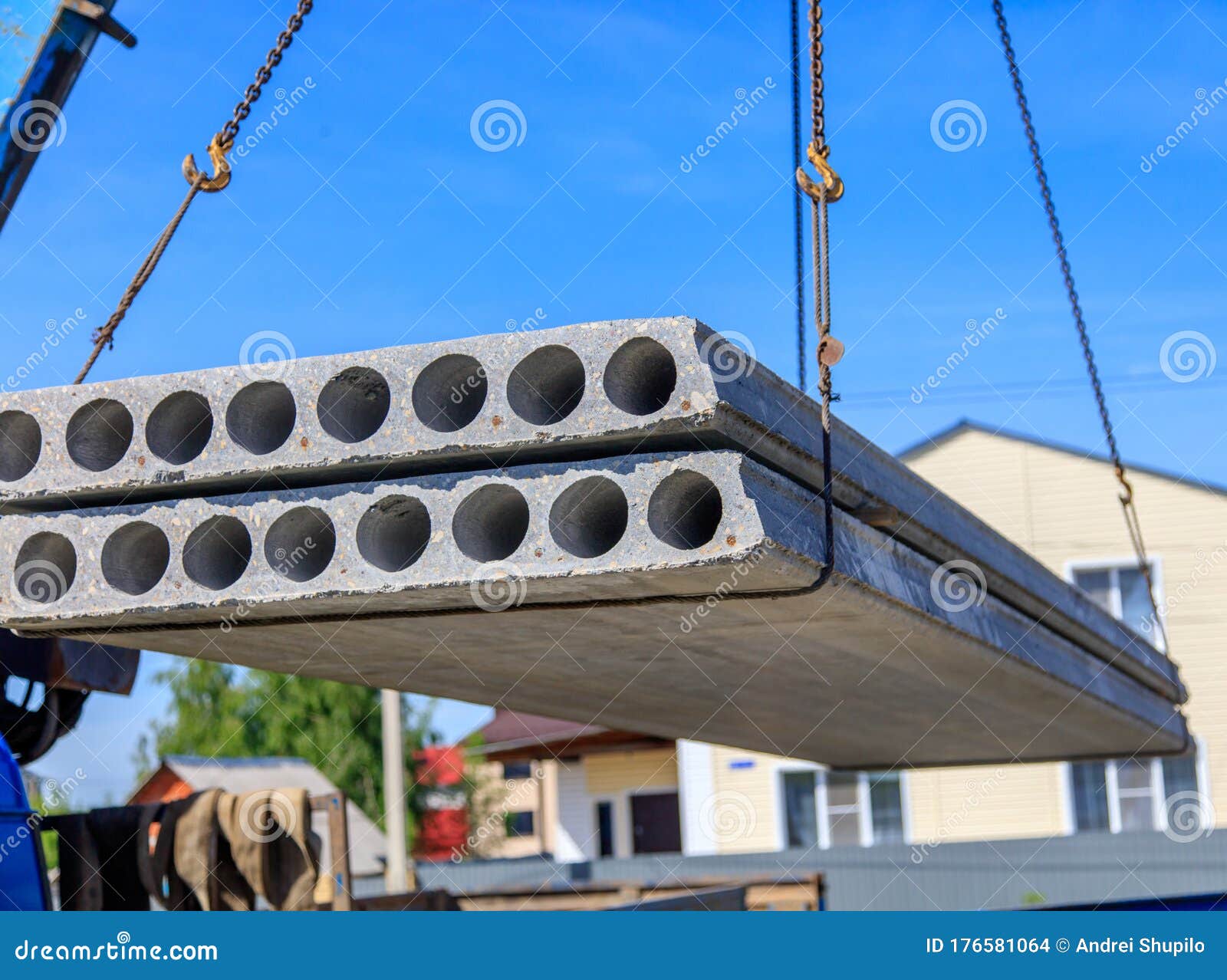 A Crane Raised a Concrete Slab at a Construction Site at Home Stock ...