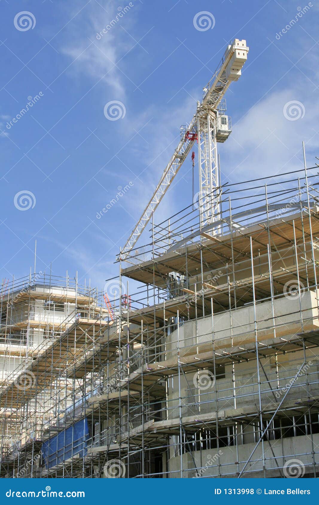 Crane and scaffolding stock photo. Image of housing, raising - 1313998