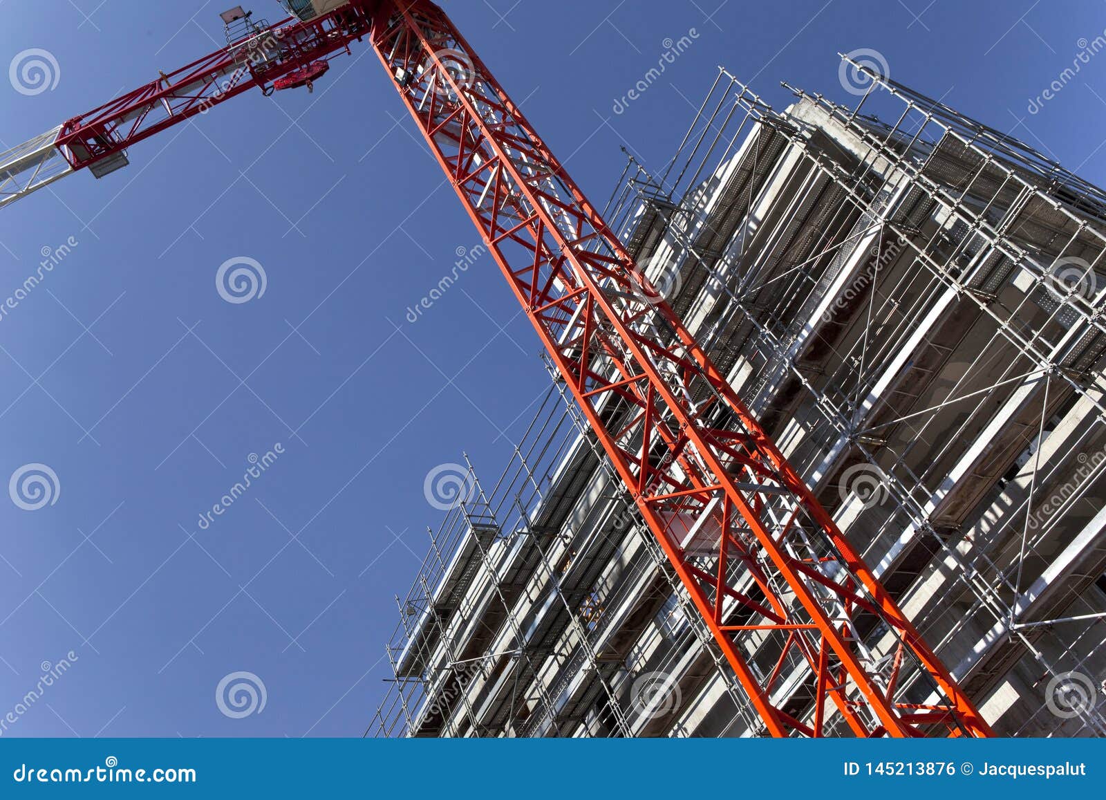 Crane And Scaffolding Surround A High Rise Under Construction Stock ...