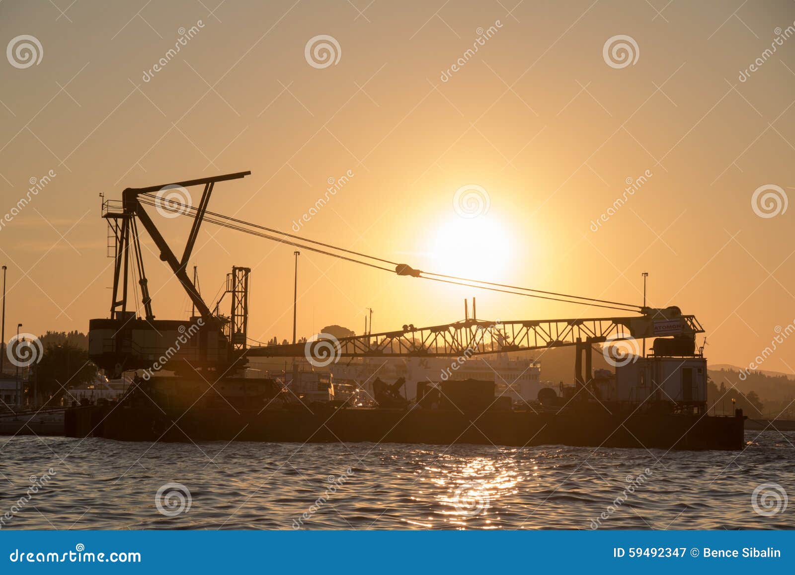 Crane Ship Docking in a Port at Sunset Stock Image - Image of colorful ...