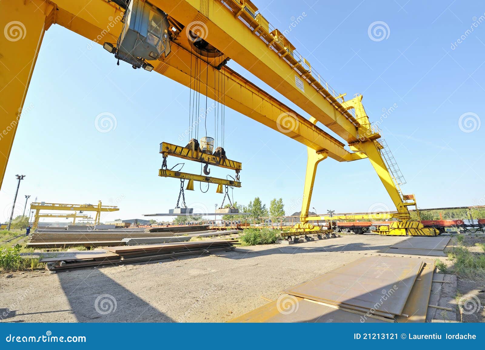 Crane and steel plates stock image. Image of roll, shaped - 21213121