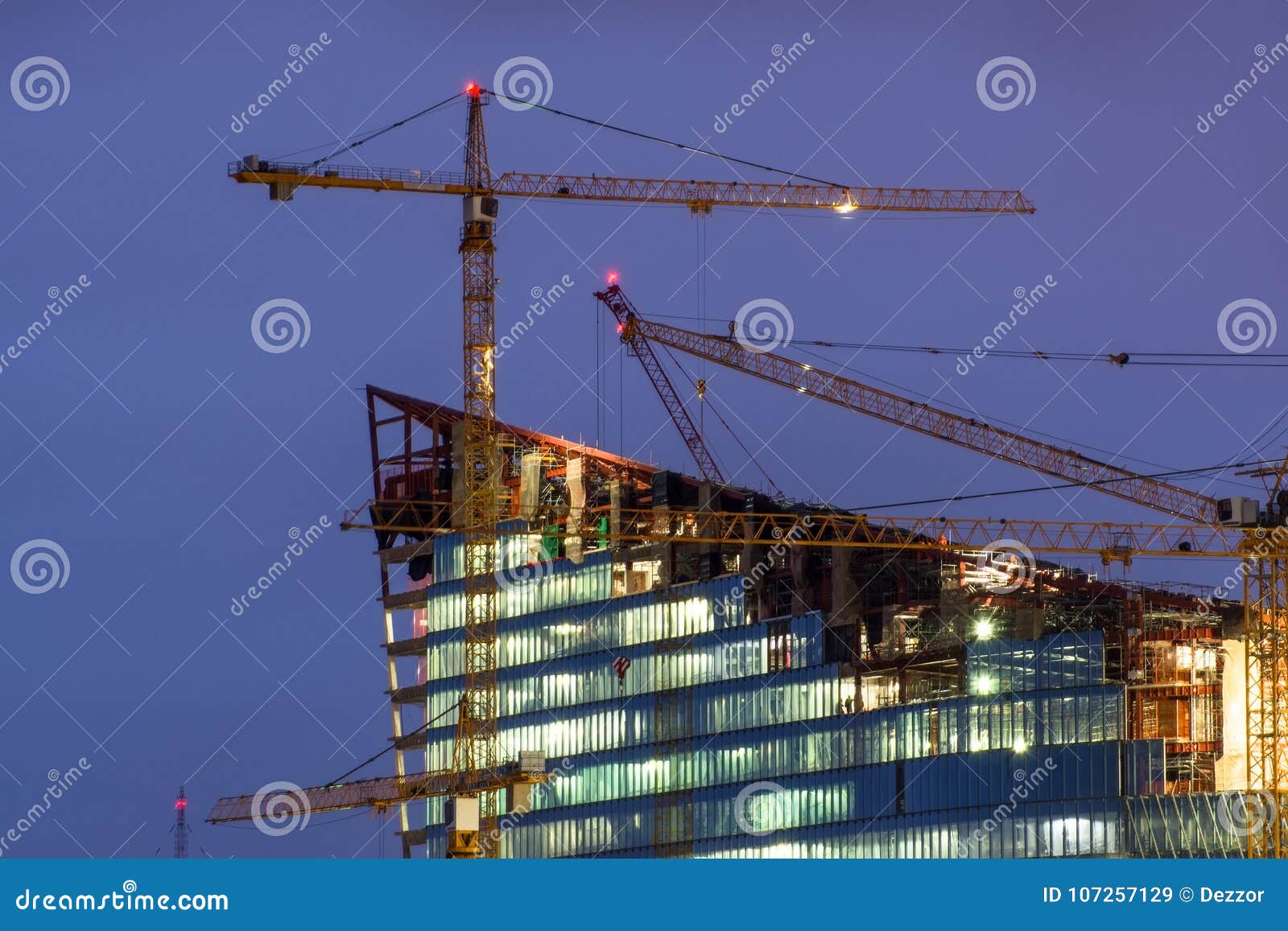 Crane on Top of Under Construction Building at Night. Stock Image ...