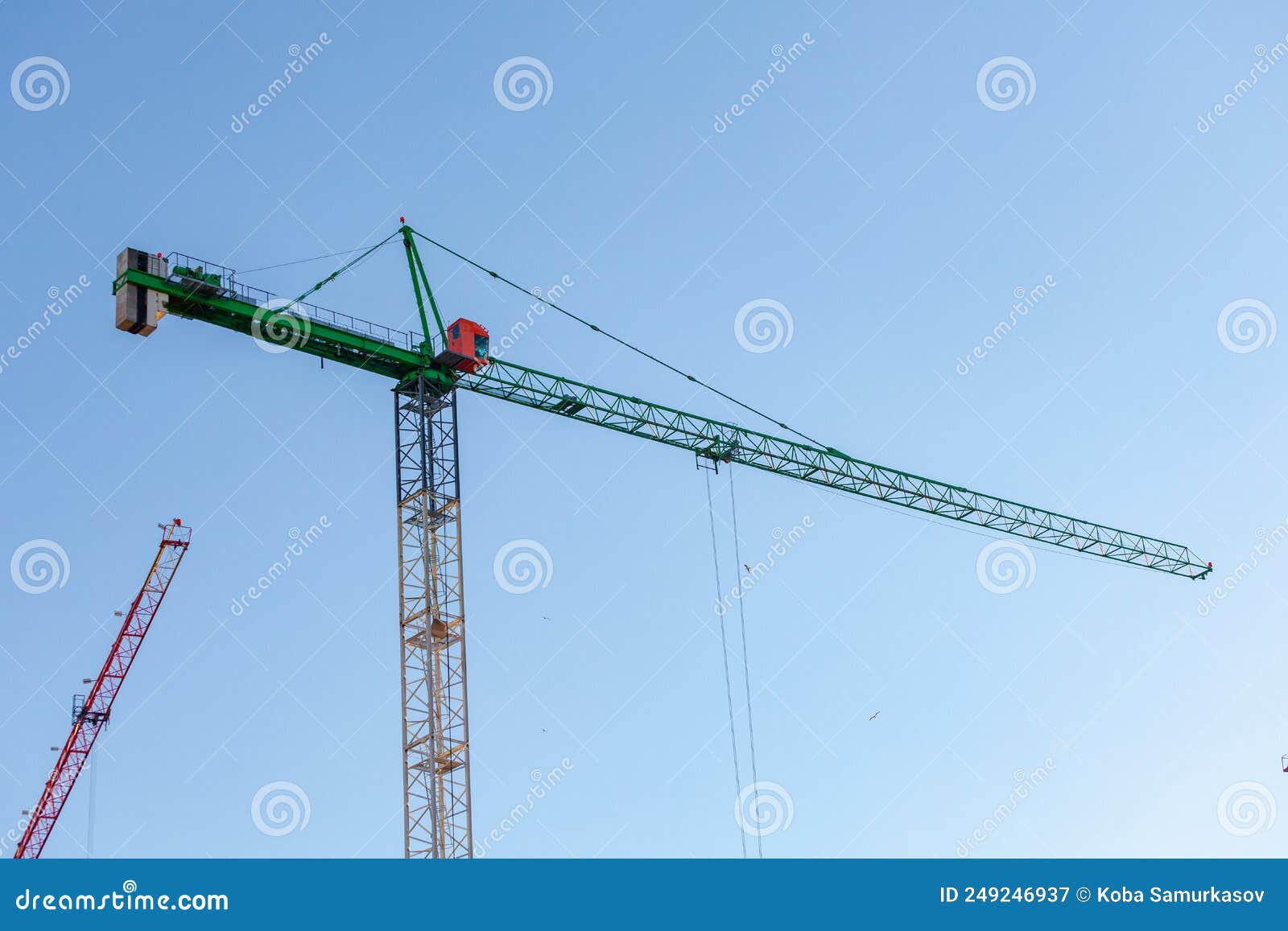 The Crane Tower in Construction Site of a High-rise Condominium ...