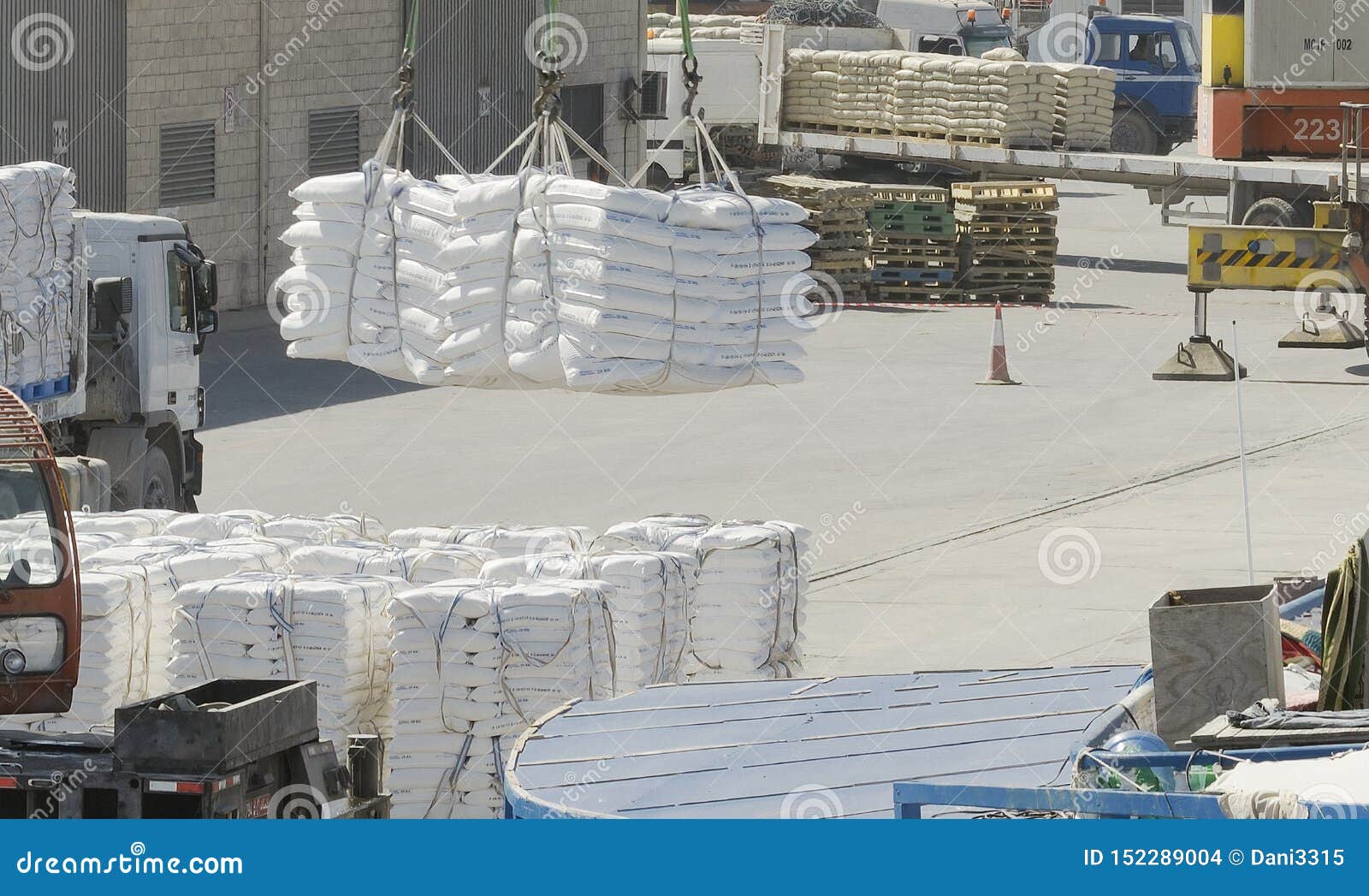 Crane Unloading Sacks at Busy Commercial Dock Editorial Stock Image ...