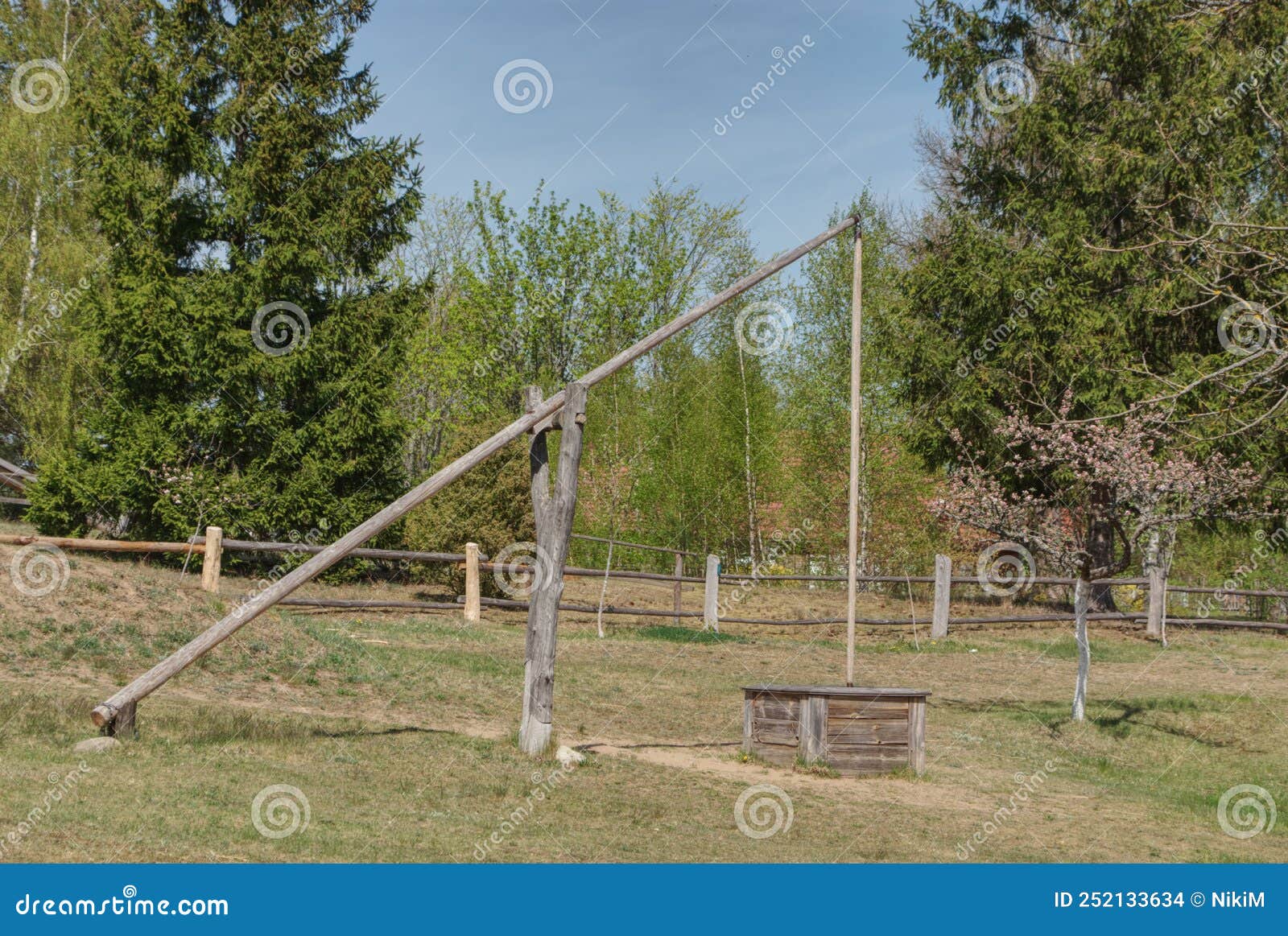 Crane, well in the village stock photo. Image of garden - 252133634