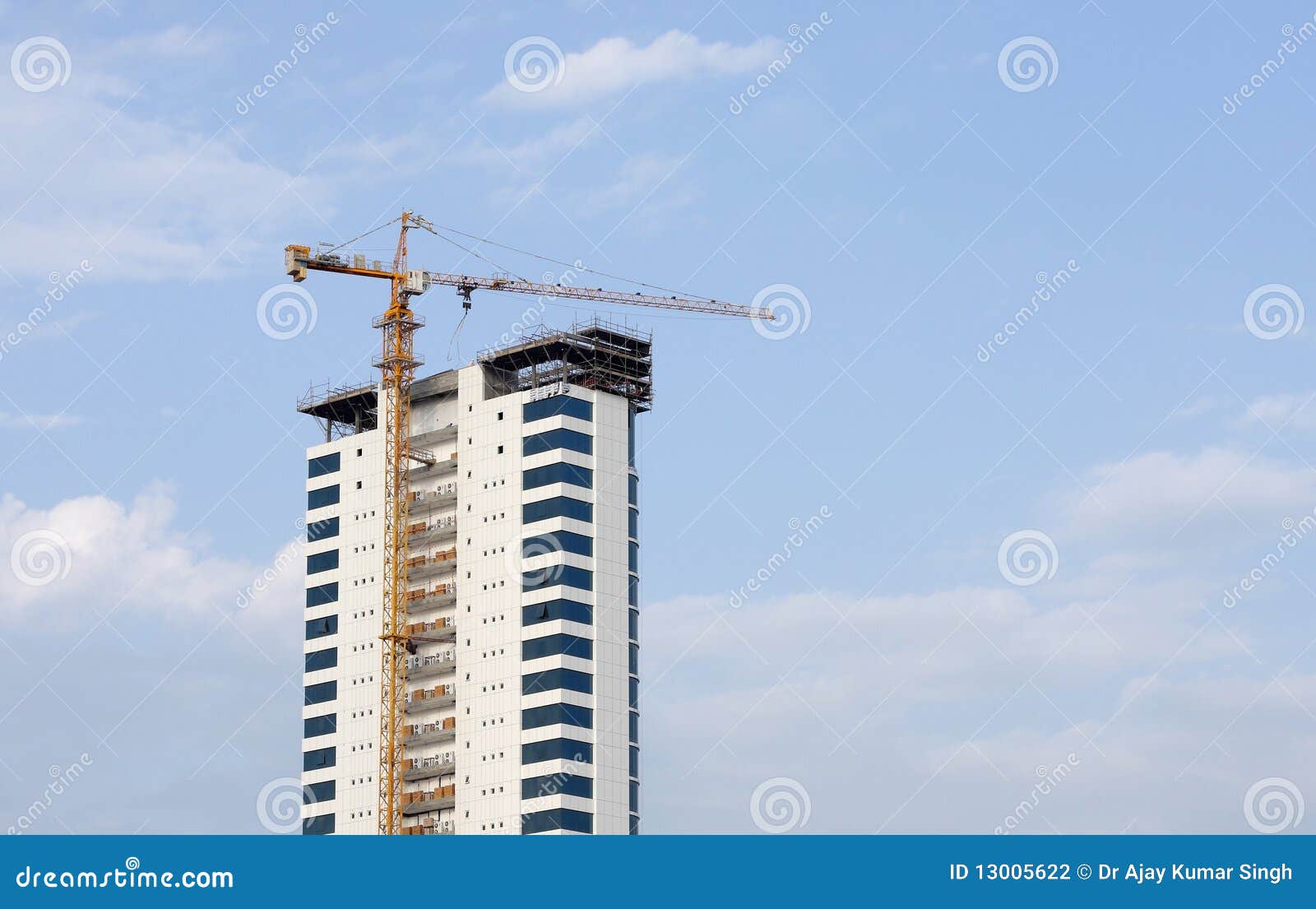 Crane at Work on a High-rise Building Stock Photo - Image of equipment ...