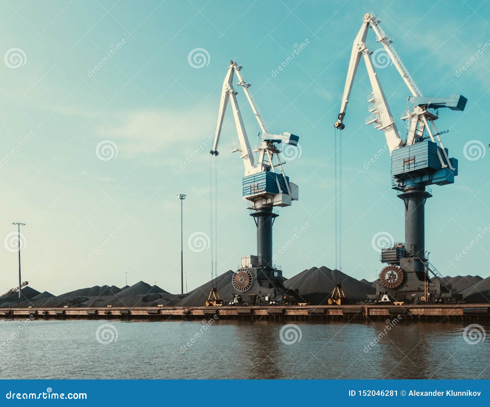 Cranes in the Bulk Terminal for Loading Bulk Cargo. Two Big Cranes ...