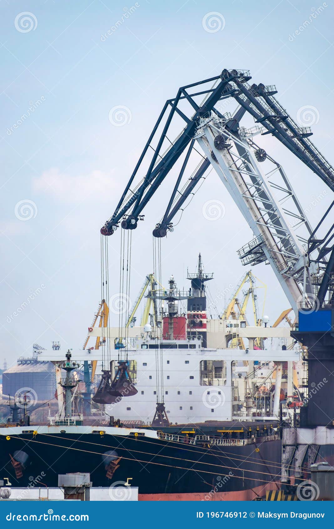 Loading Bulk Cargo Of Limestone From Barges Into A Bulk Carrier By ...