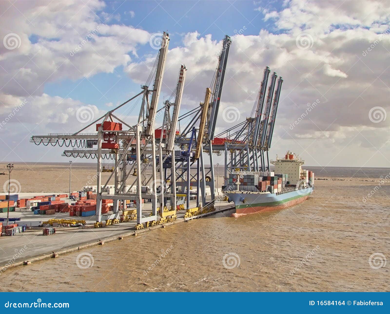 Cranes and cargo ship stock photo. Image of international - 16584164