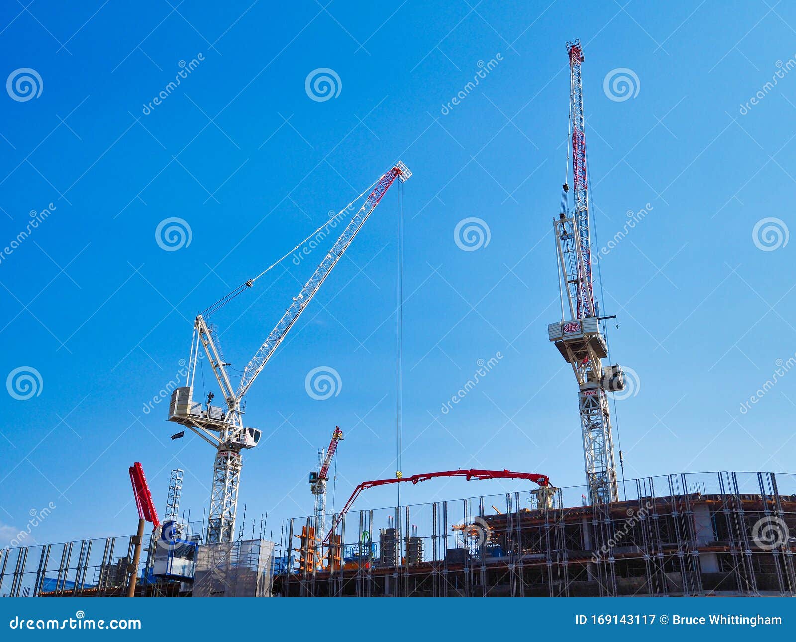 Cranes and Concrete Pump on Construction Site Editorial Photography ...