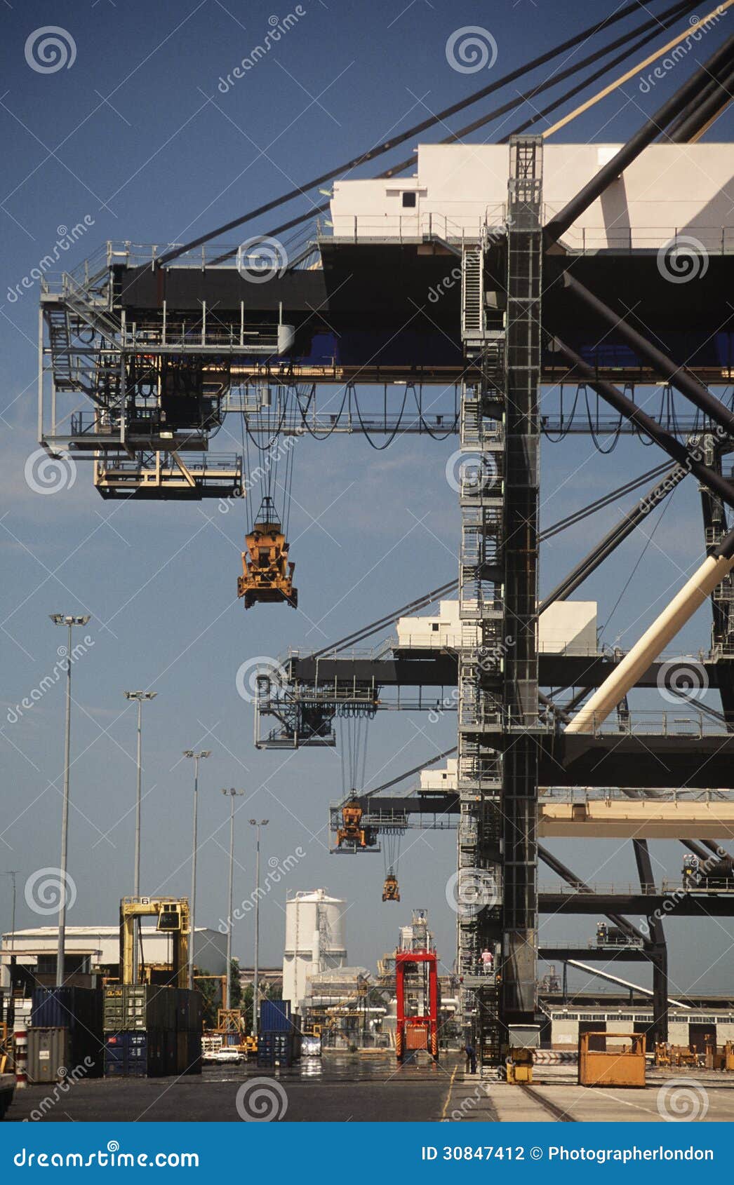 Cranes on container dock editorial photography. Image of loading - 30847412