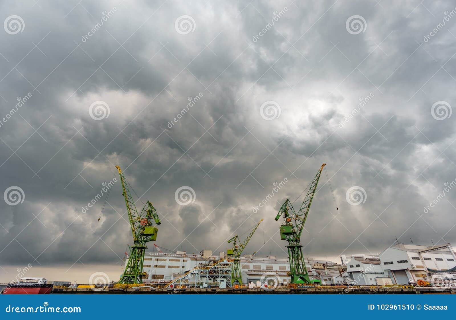 Cranes in the Port Against Storm Stock Photo - Image of huge, storm ...