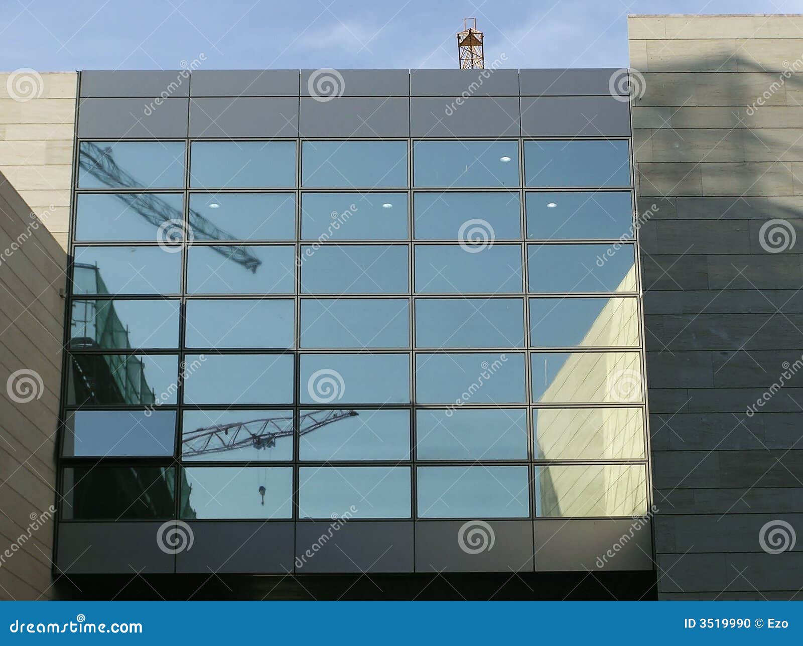 Cranes Reflected in Windows Stock Photo - Image of cranes, buildings ...