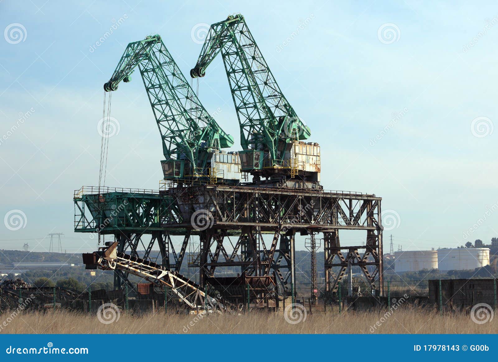 Cranes and scrapyard stock image. Image of water, transportation - 17978143