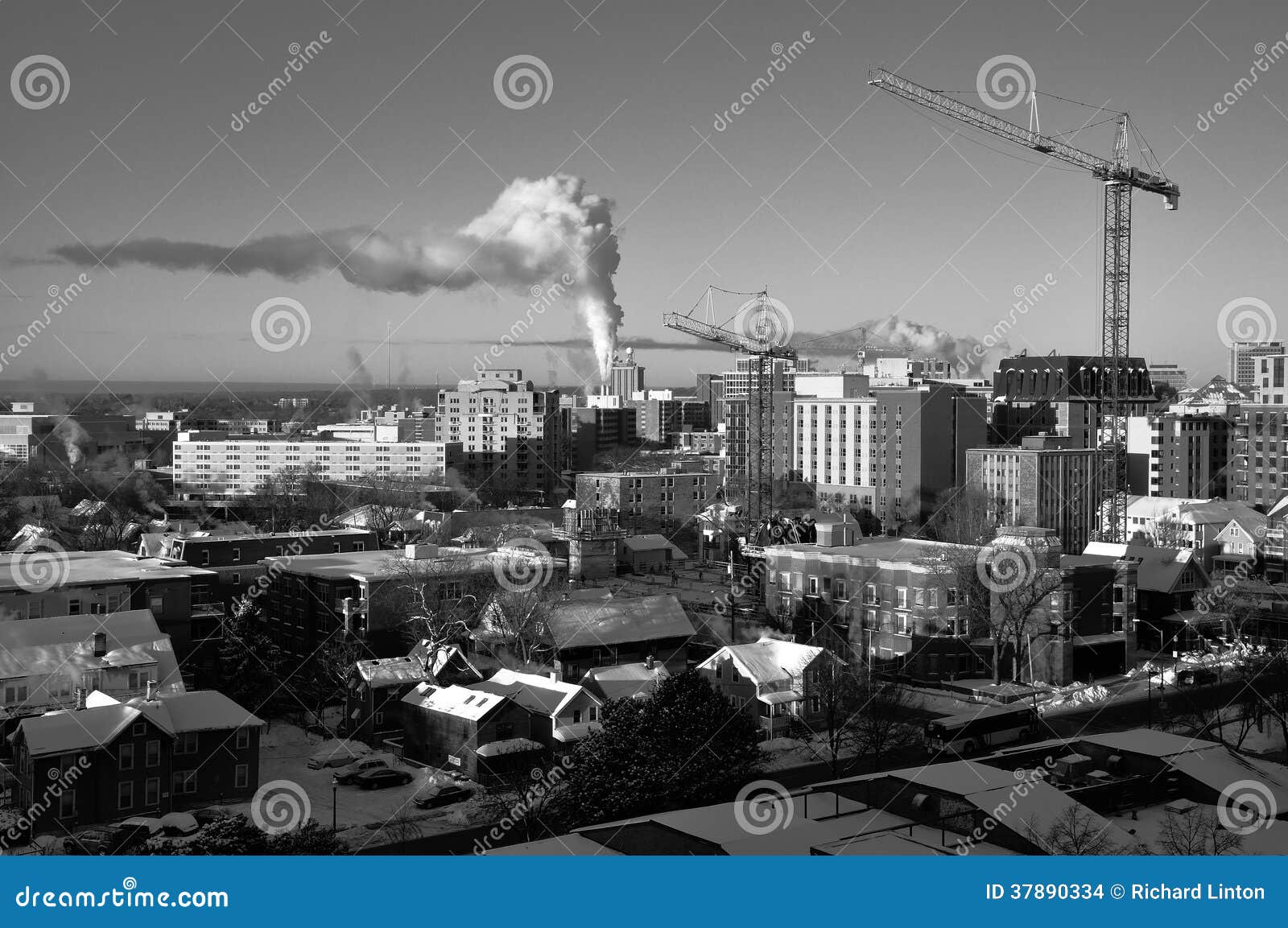 Cranes and Smoke on a Cold Morning Stock Photo - Image of smog, towers ...