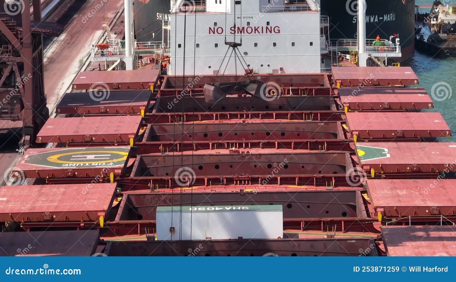 Cranes Unloading Cargo from a Bulk Carrier Ship at Port Stock Video ...