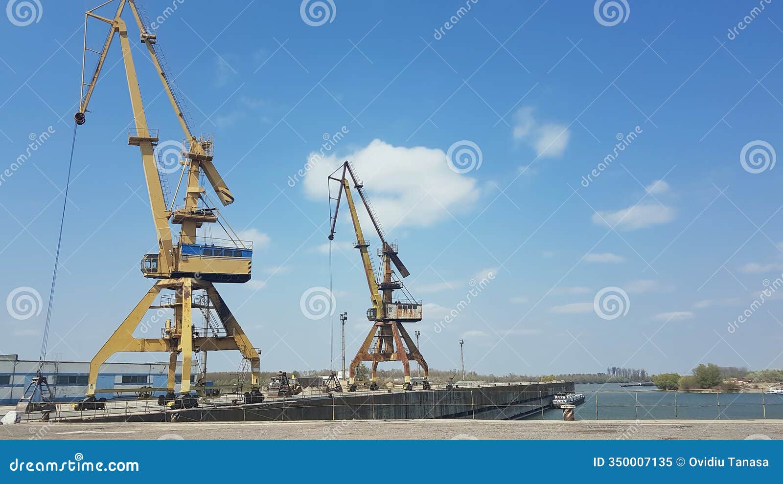 Cranes for Unloading and Loading in Port Stock Image - Image of frame ...