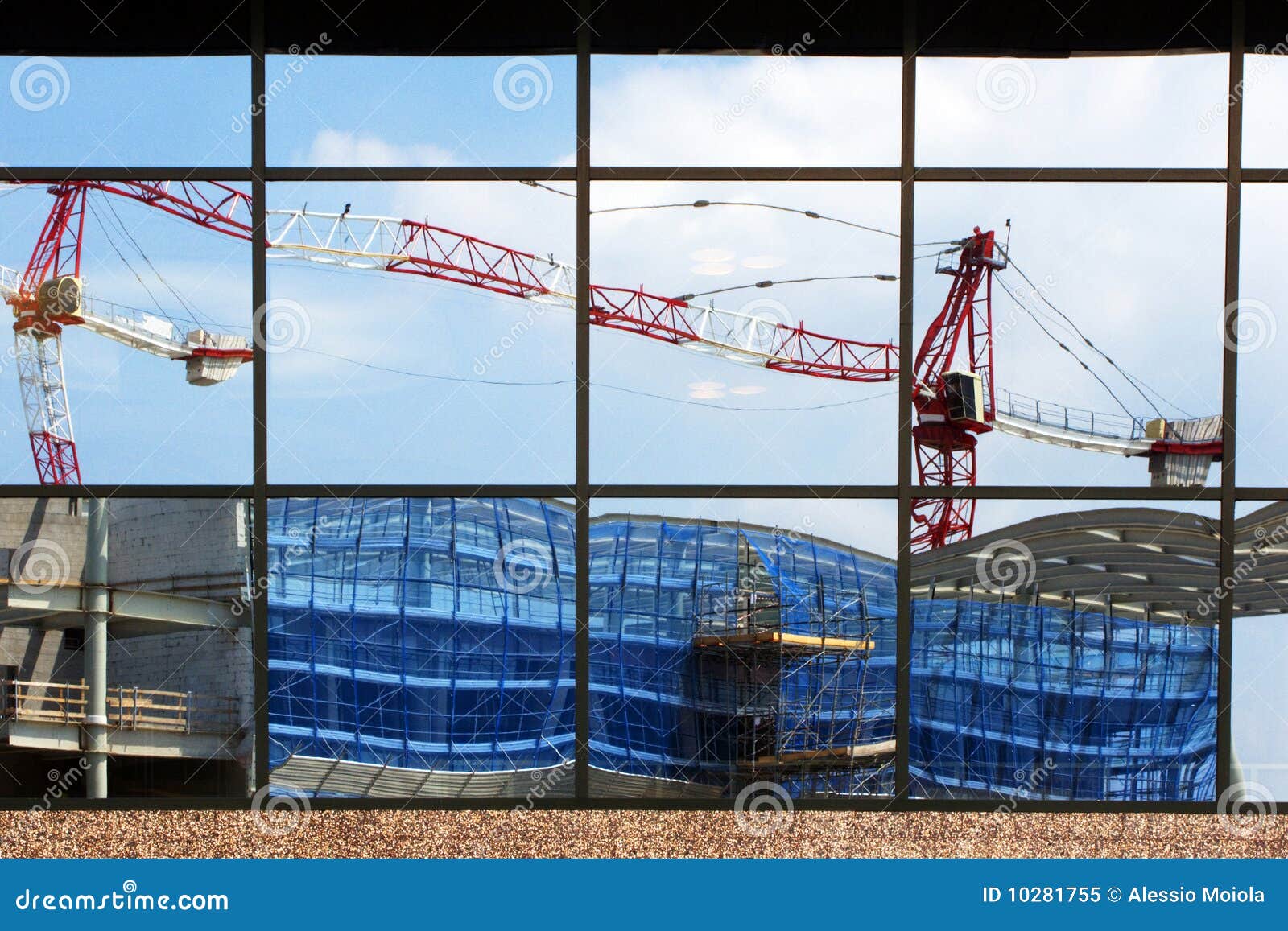 Cranes and Yard Reflected in Glass Window Stock Image - Image of ...