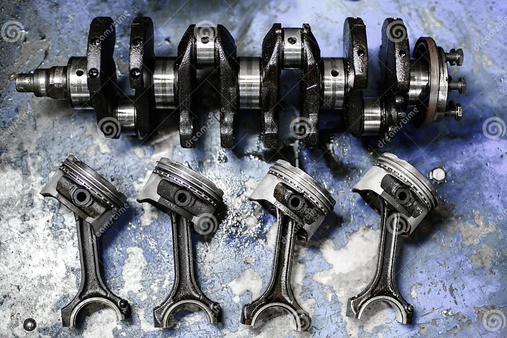 Crankshaft and Pistons with Connecting Rods on the Table Stock Photo ...