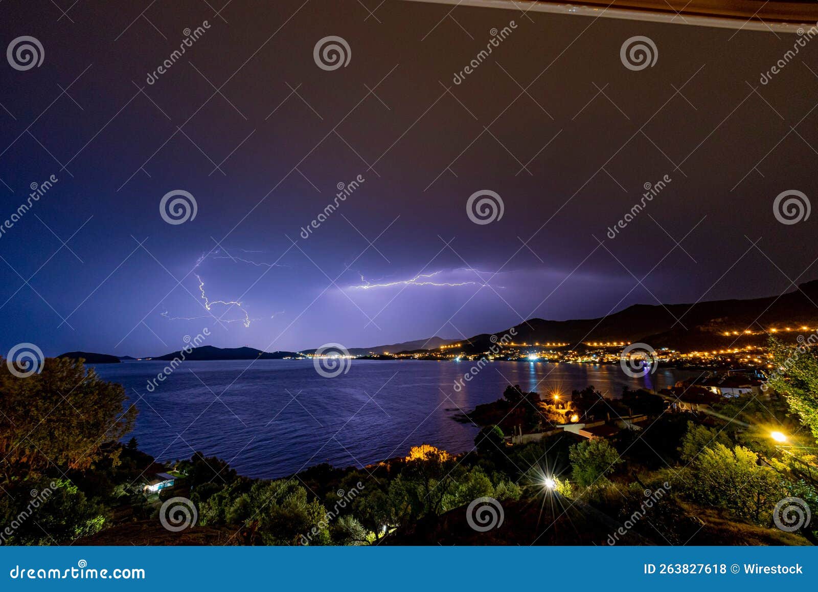 Crash of Thunder and Lightning Over the City among the Clouds through ...