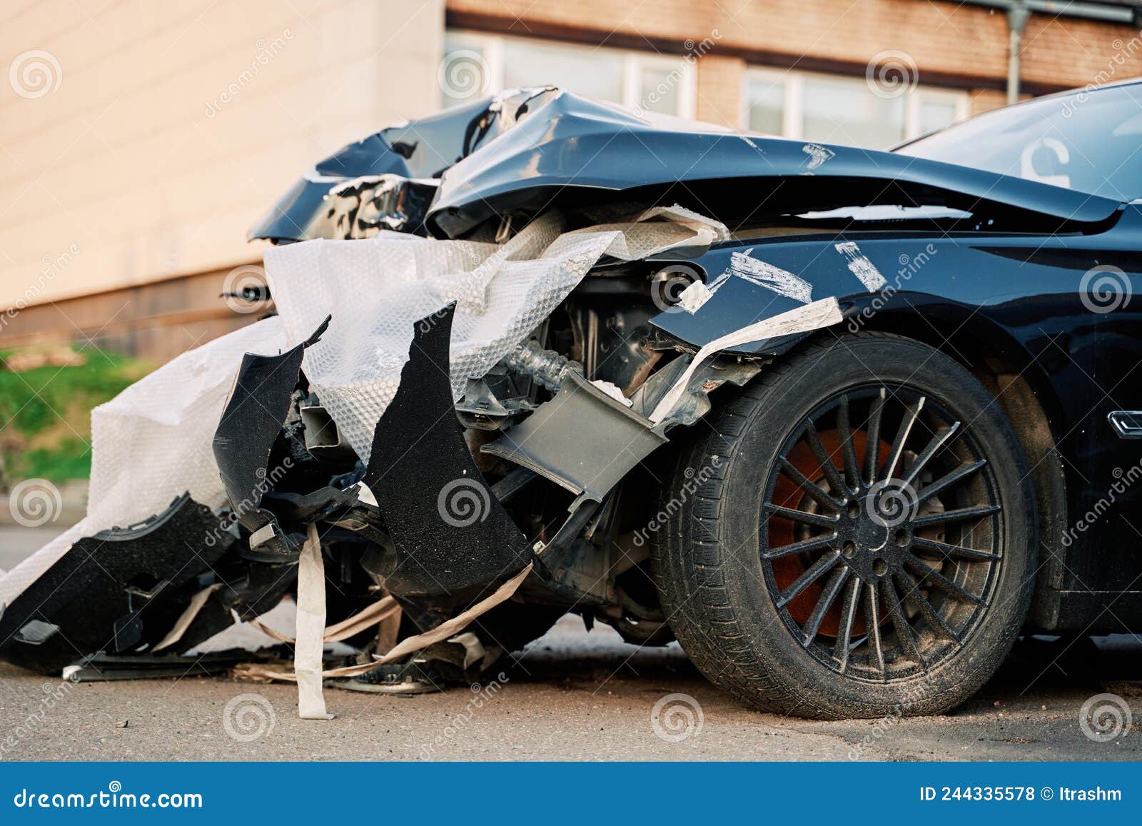 Crashed car on city street stock photo. Image of danger - 244335578