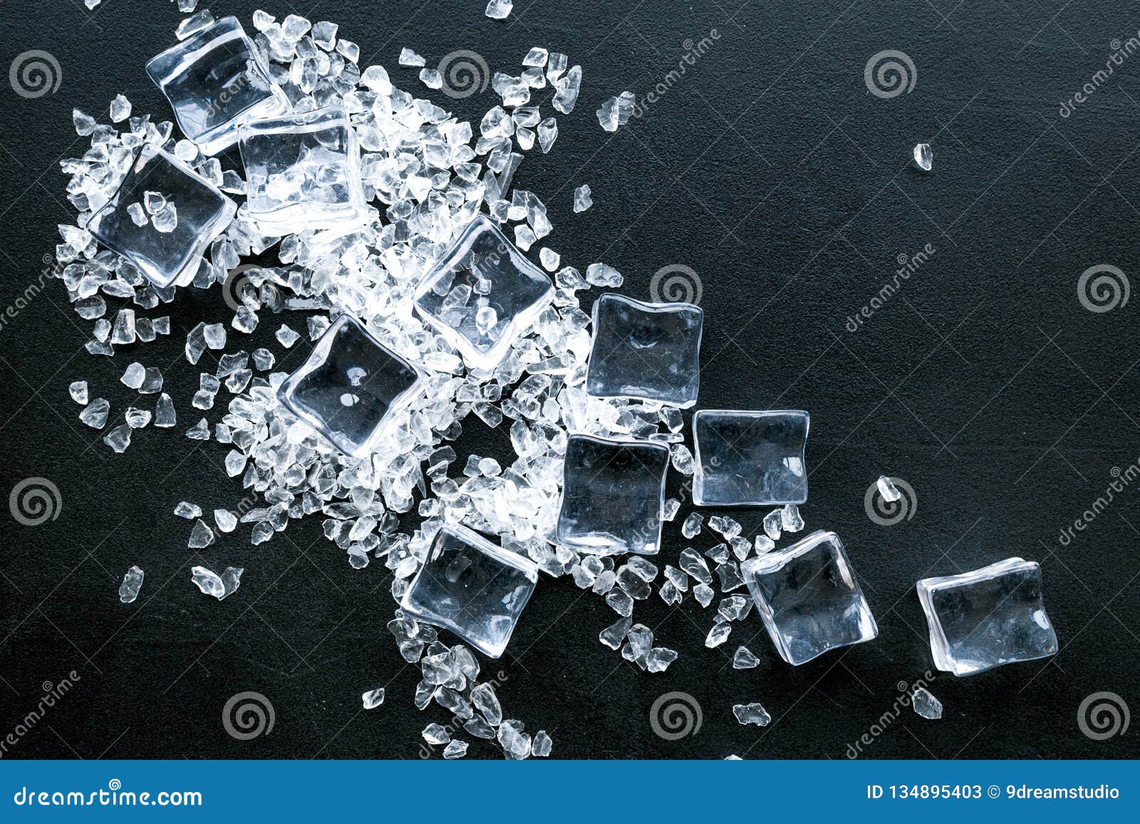 Crashed Ice Cubes on Black Kitchen Table Top View Stock Image - Image ...