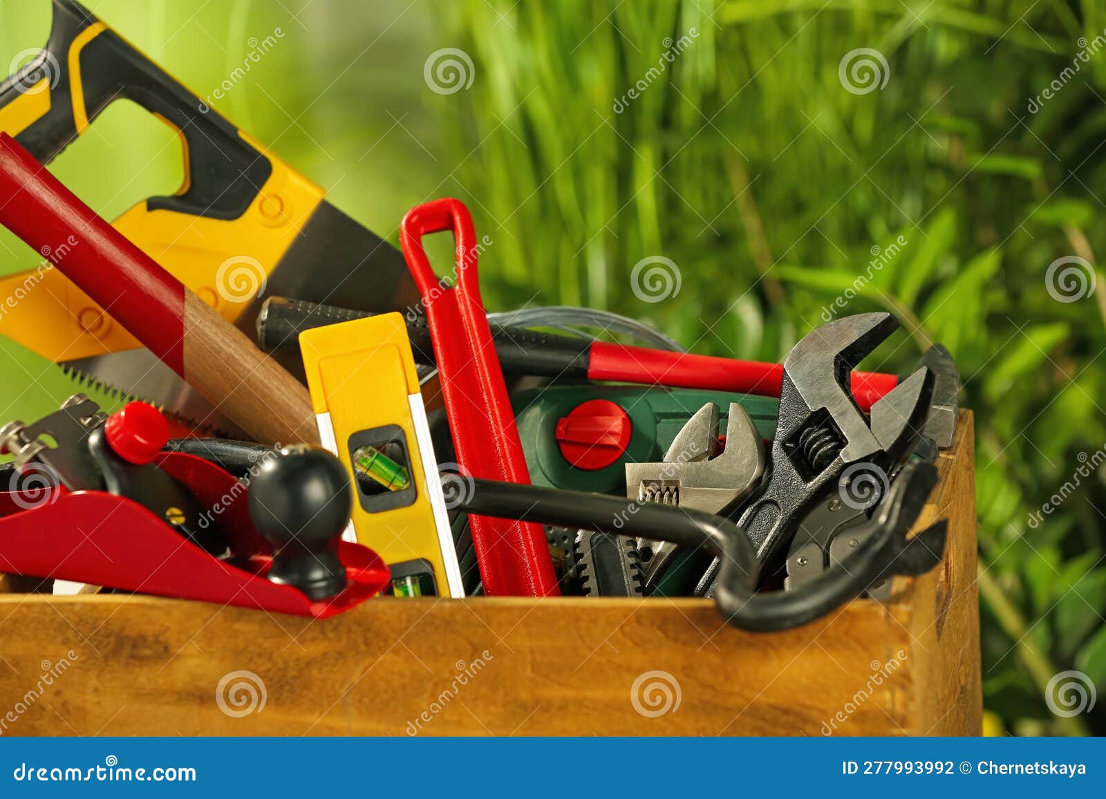 Crate with Different Tools Outdoors, Closeup View Stock Photo - Image ...