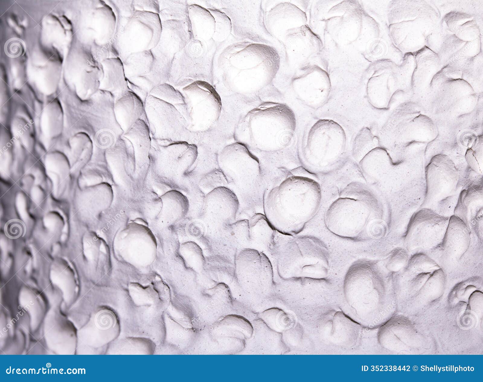 Crater Holes and Dips in Pottery Clay in a Thick White Texture Dots ...