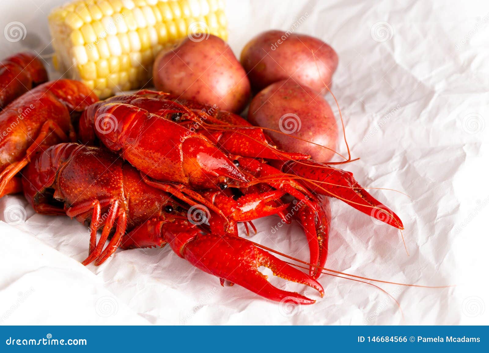 A Crawfish Boil with Corn on the Cob and Potatoes Stock Photo - Image ...