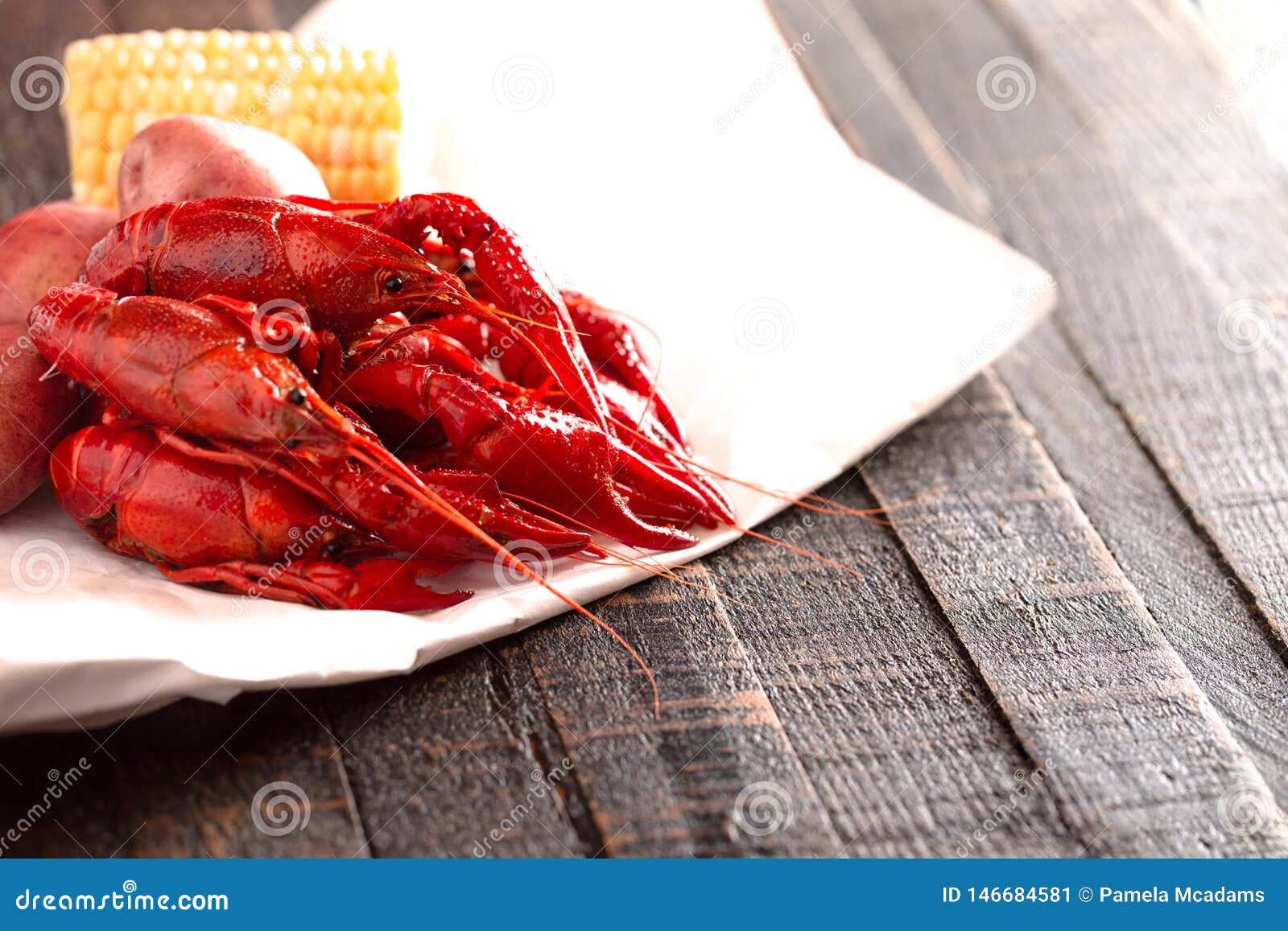 A Crawfish Boil with Corn on the Cob and Potatoes Stock Image - Image ...