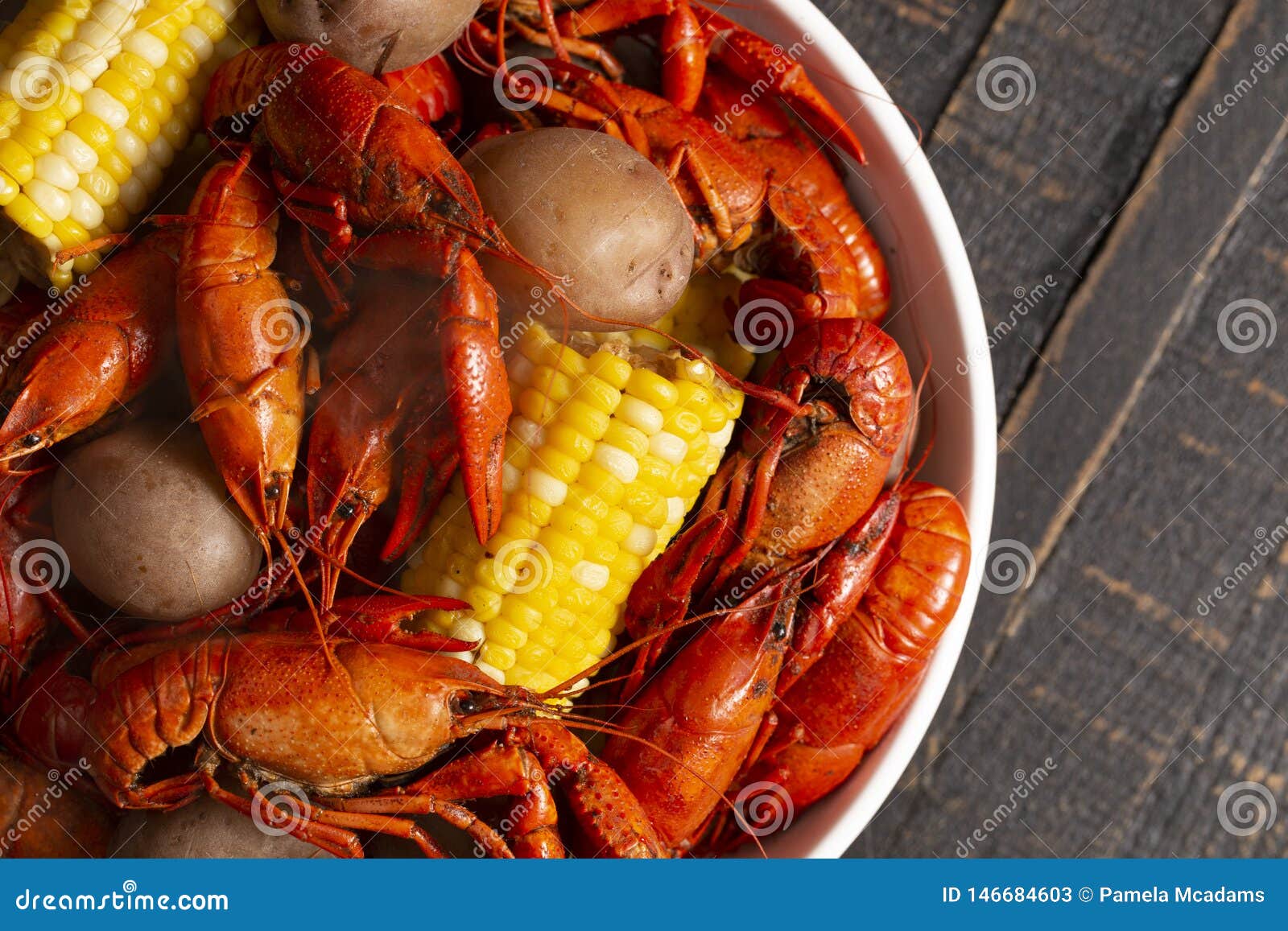 A Crawfish Boil with Corn on the Cob and Potatoes Stock Image - Image ...
