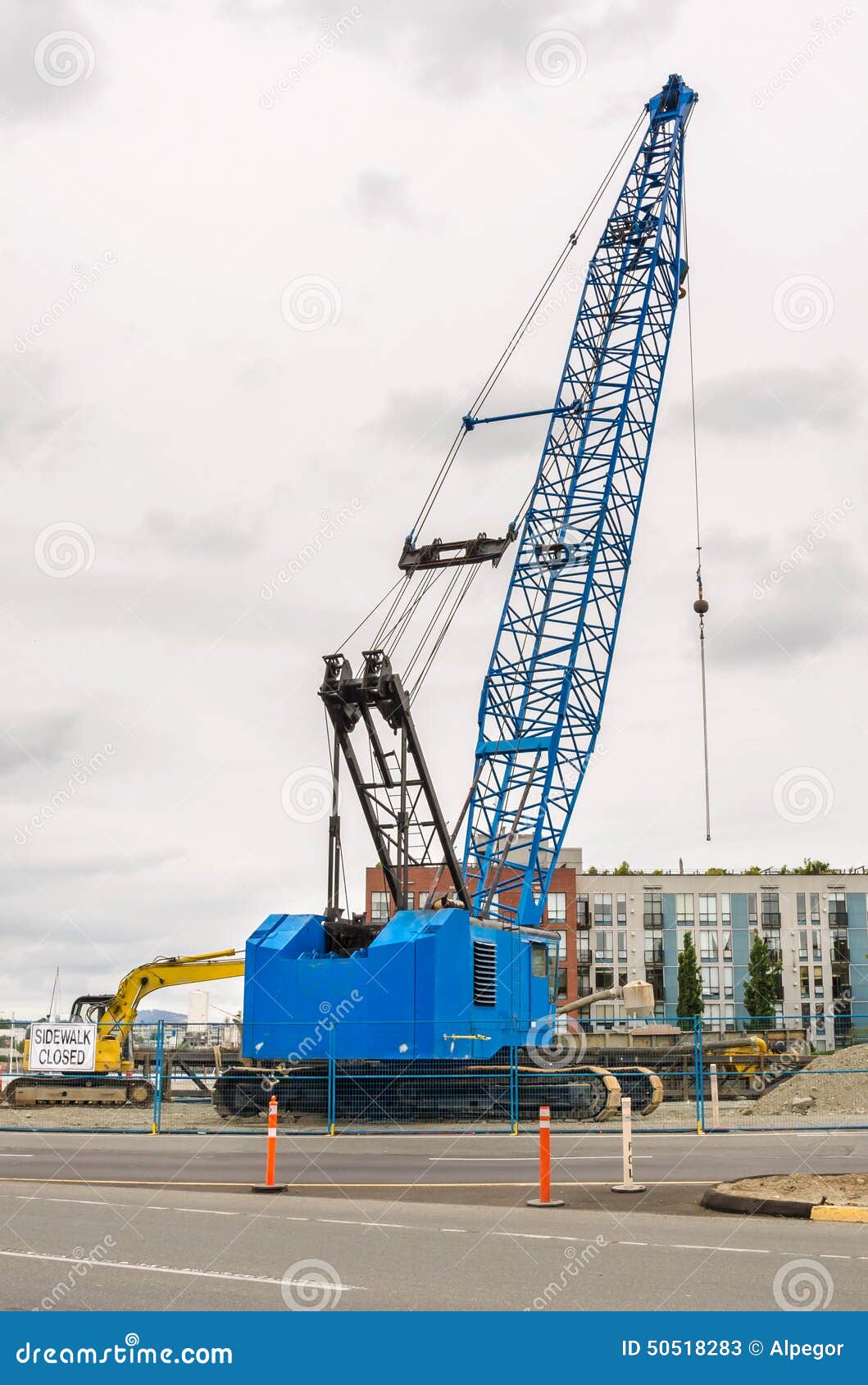 Crawler Crane With A Heavy Metal Wrecking Ball On A Steel Cable At ...